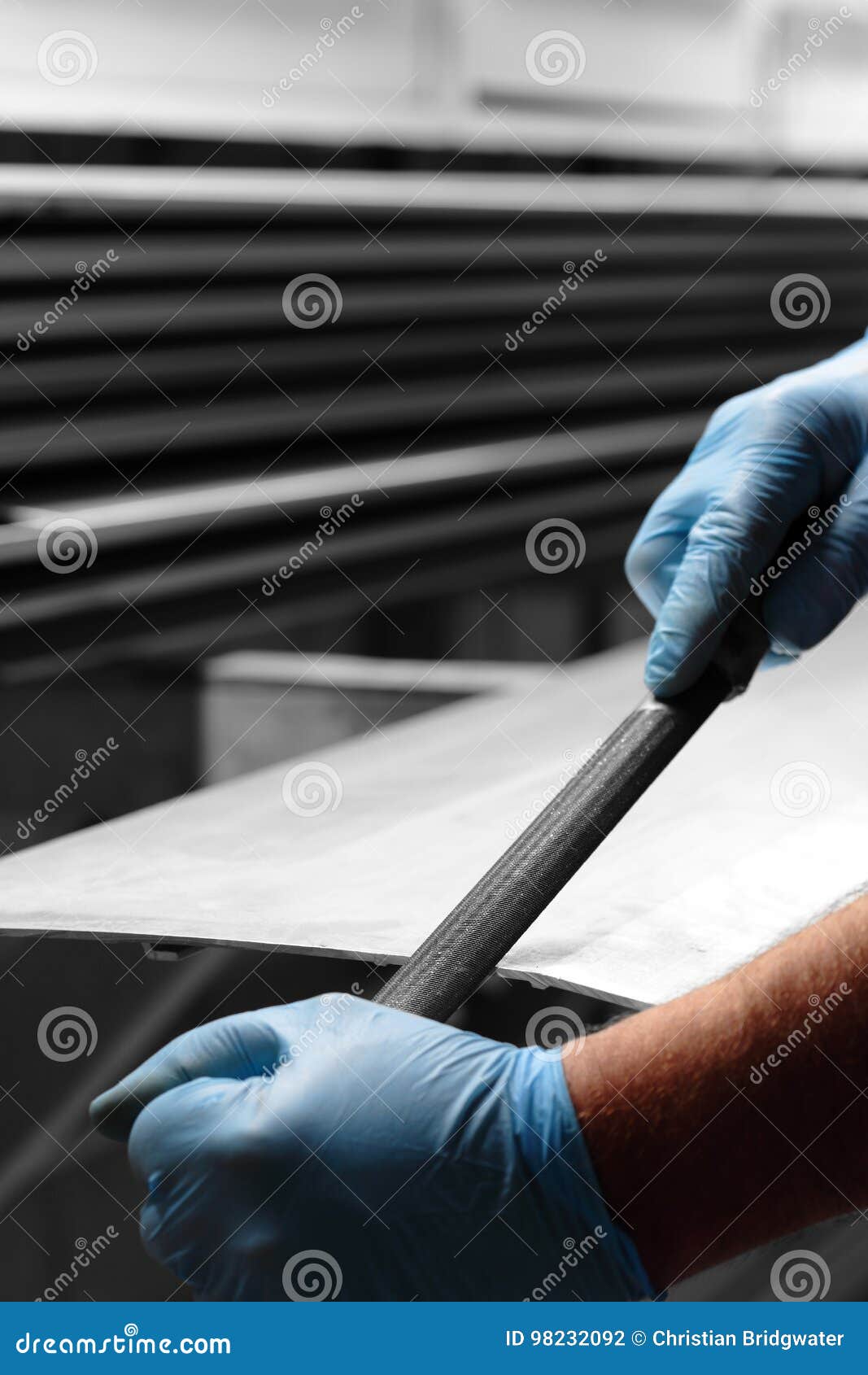 Man Filing Deburring a Metal Panel with a File Stock Photo - Image of ...