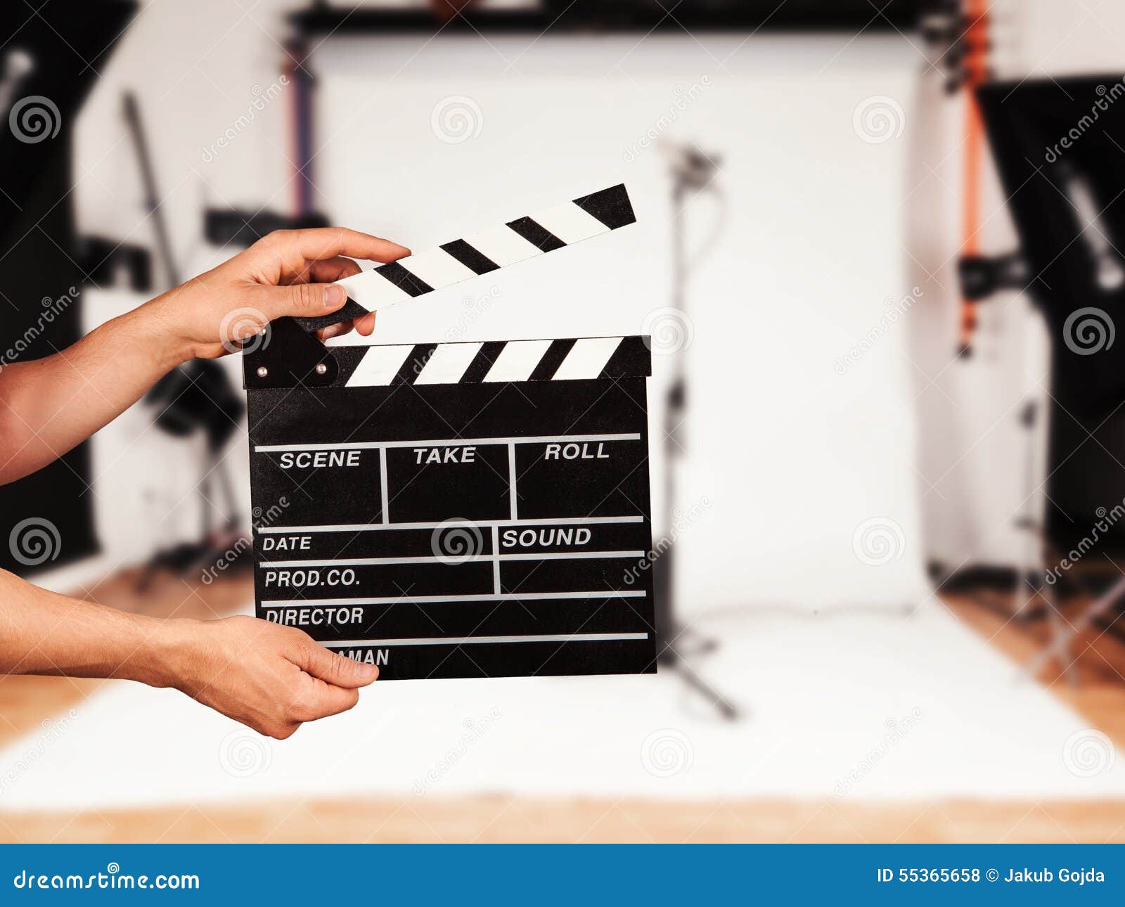Man with Film Clapper in Studio Stock Photo - Image of screen ...