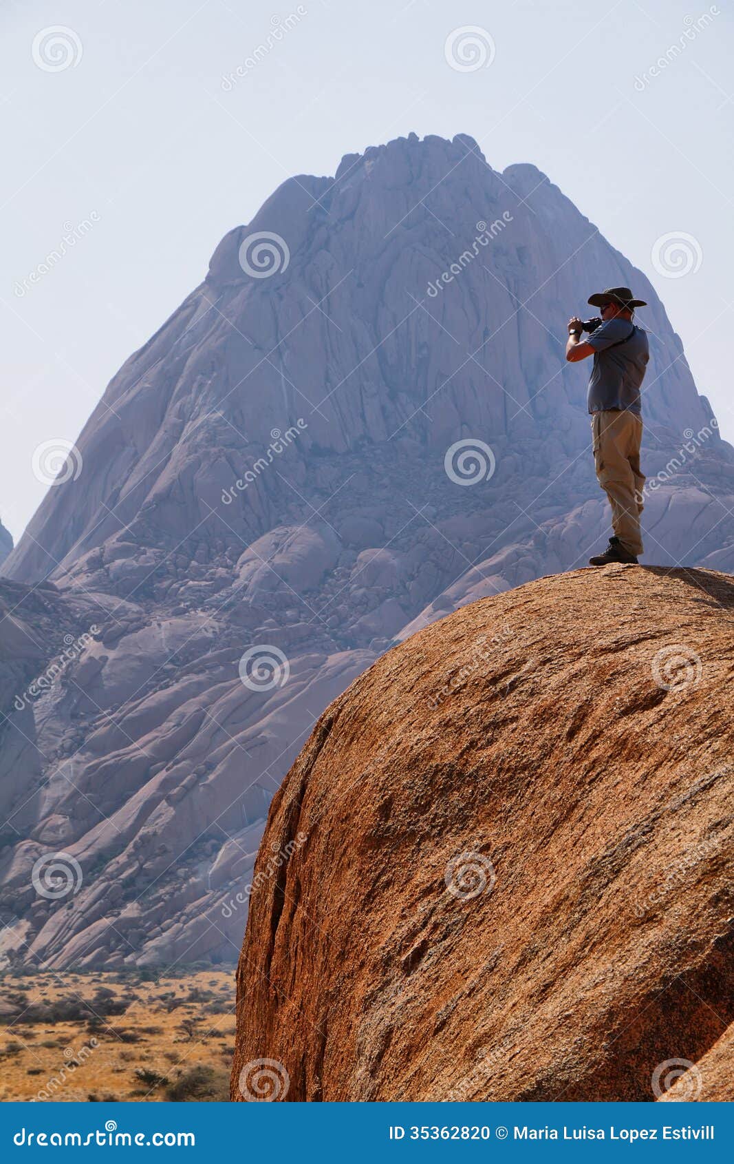 A Man Filming the Landscape in Spitzkoppe Stock Photo - Image of ...