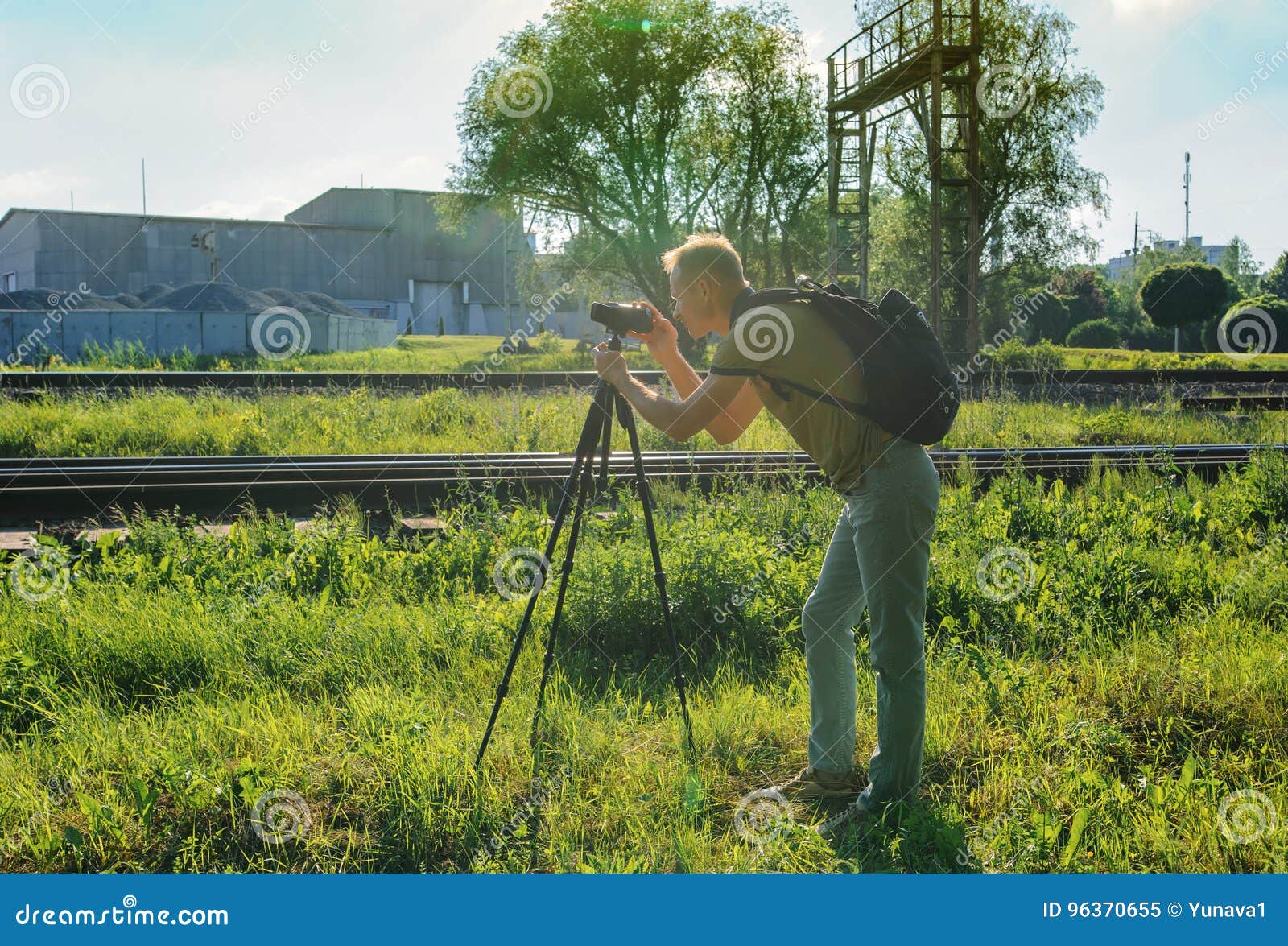 A man is filming outdoor. stock image. Image of equipment - 96370655