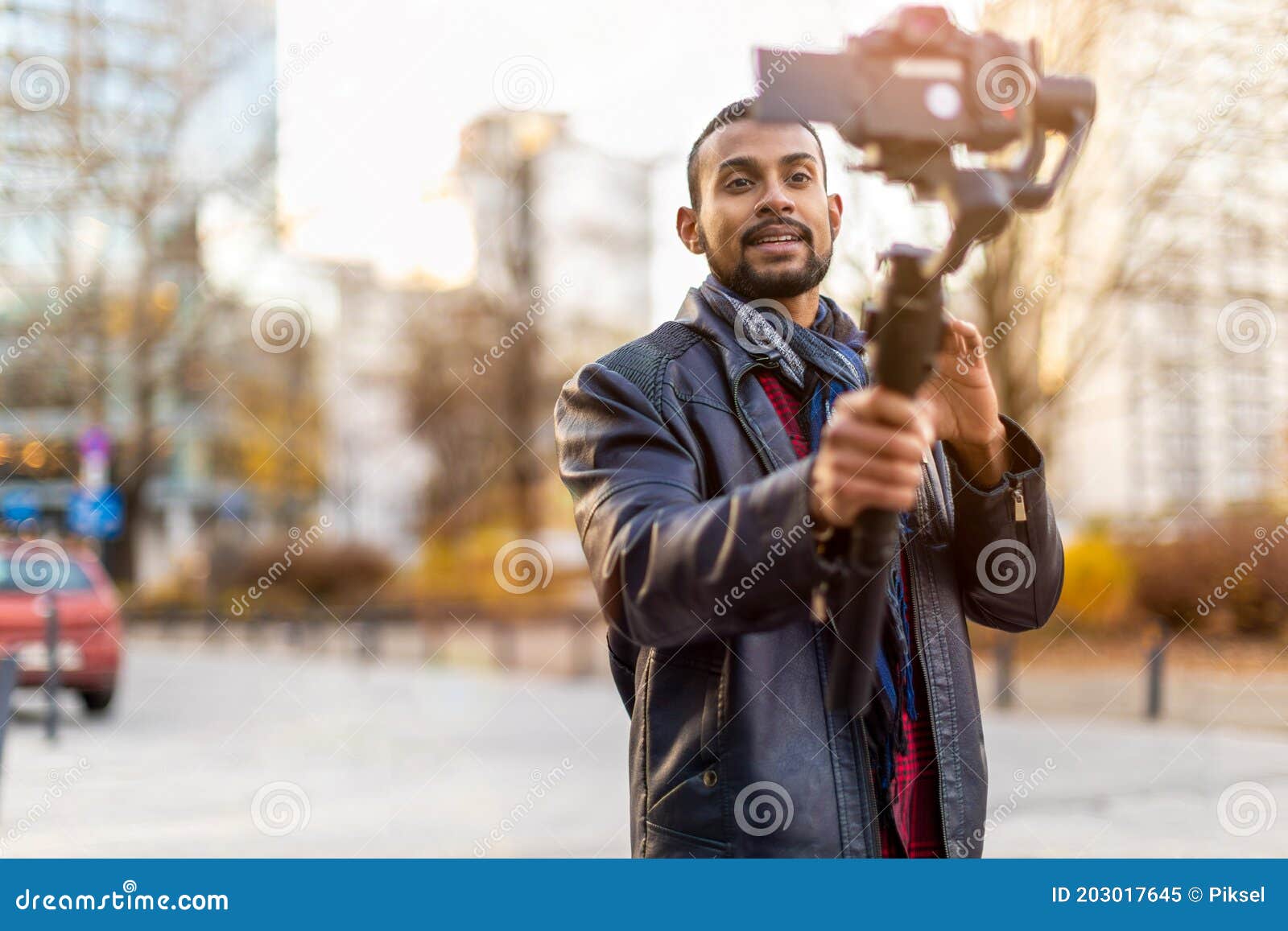 Man Filming a Vlog with Camera in the City Stock Image - Image of ...