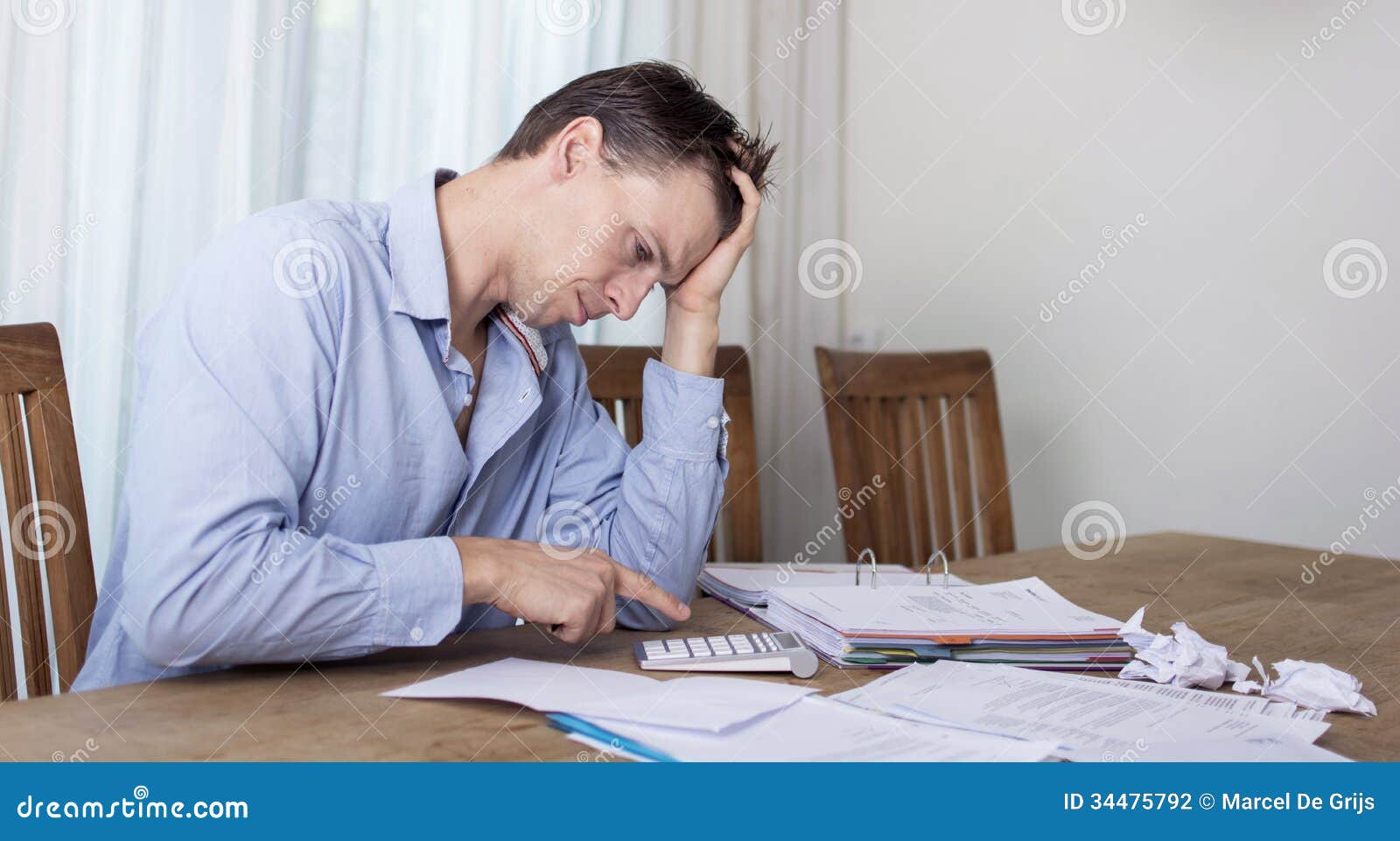 Man in financial stress stock photo. Image of burden - 34475792