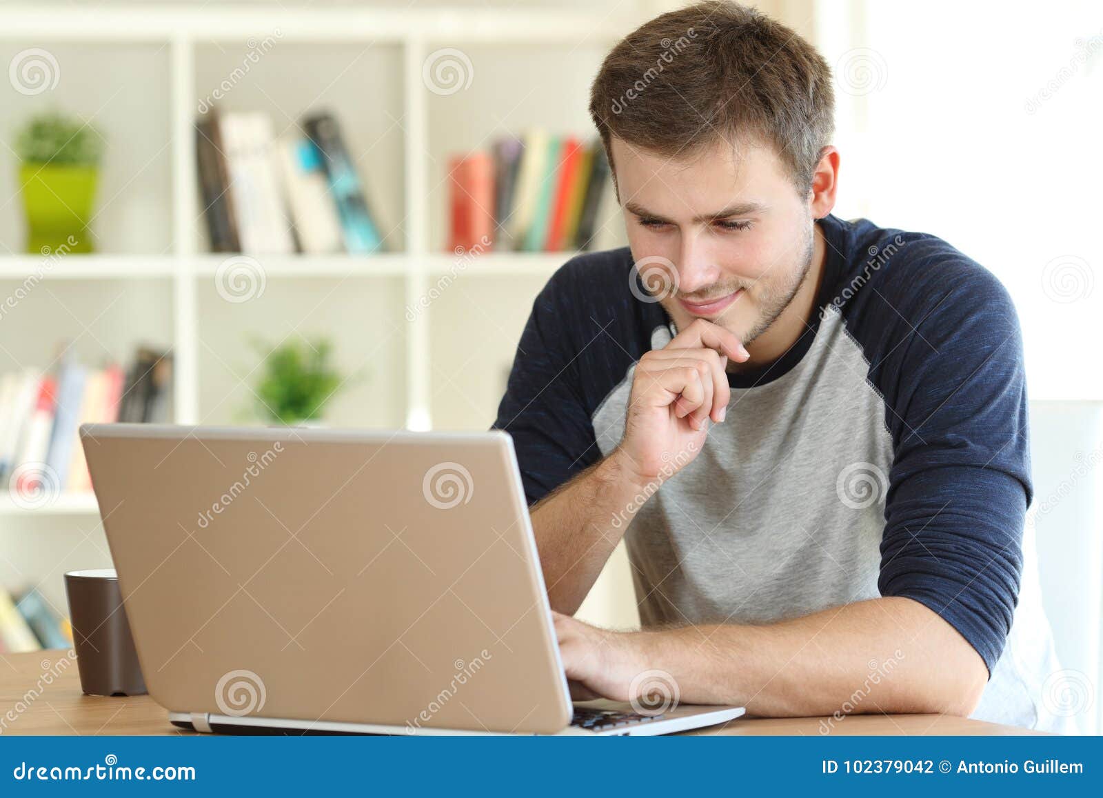 Man Finding Interesting Content on Line in a Laptop Stock Photo - Image ...