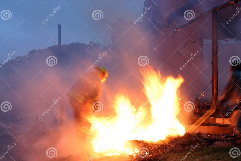 Man in fire stock photo. Image of fire, extinguishing - 16576326