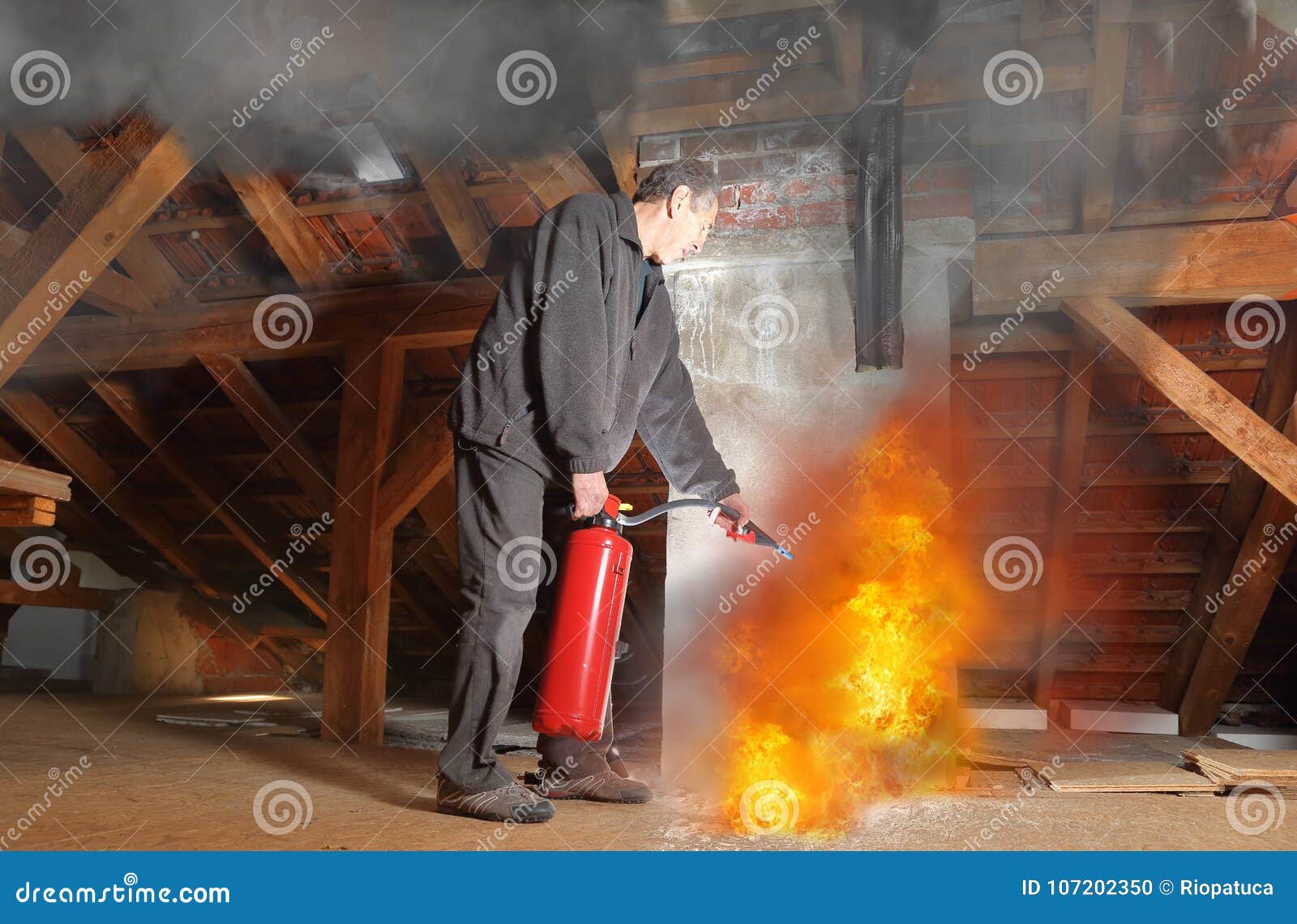 Man with Fire Extinguisher Fighting Agains Fire in His House Stock ...