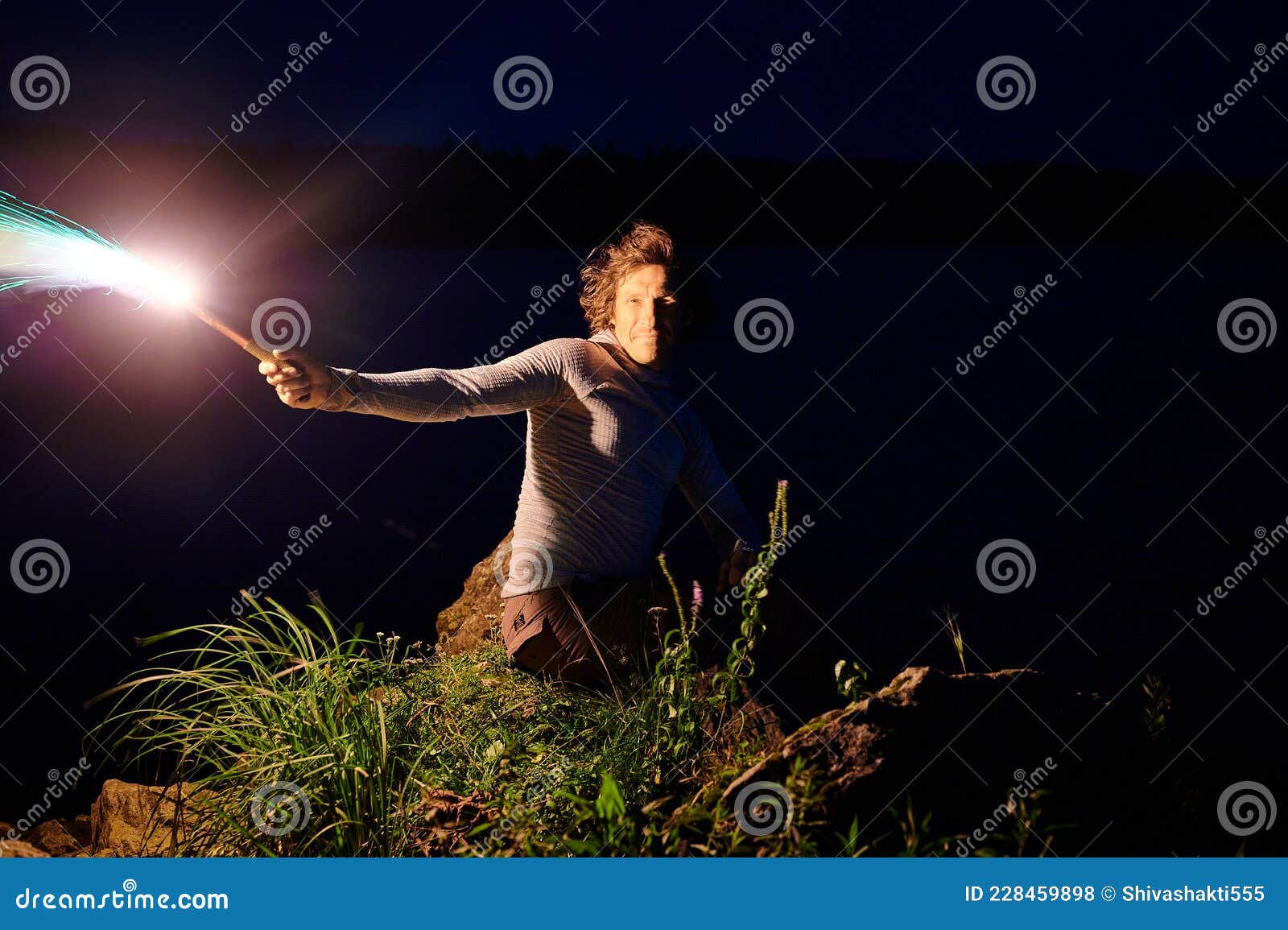 The man with fireworks in stock photo. Image of outdoor - 228459898