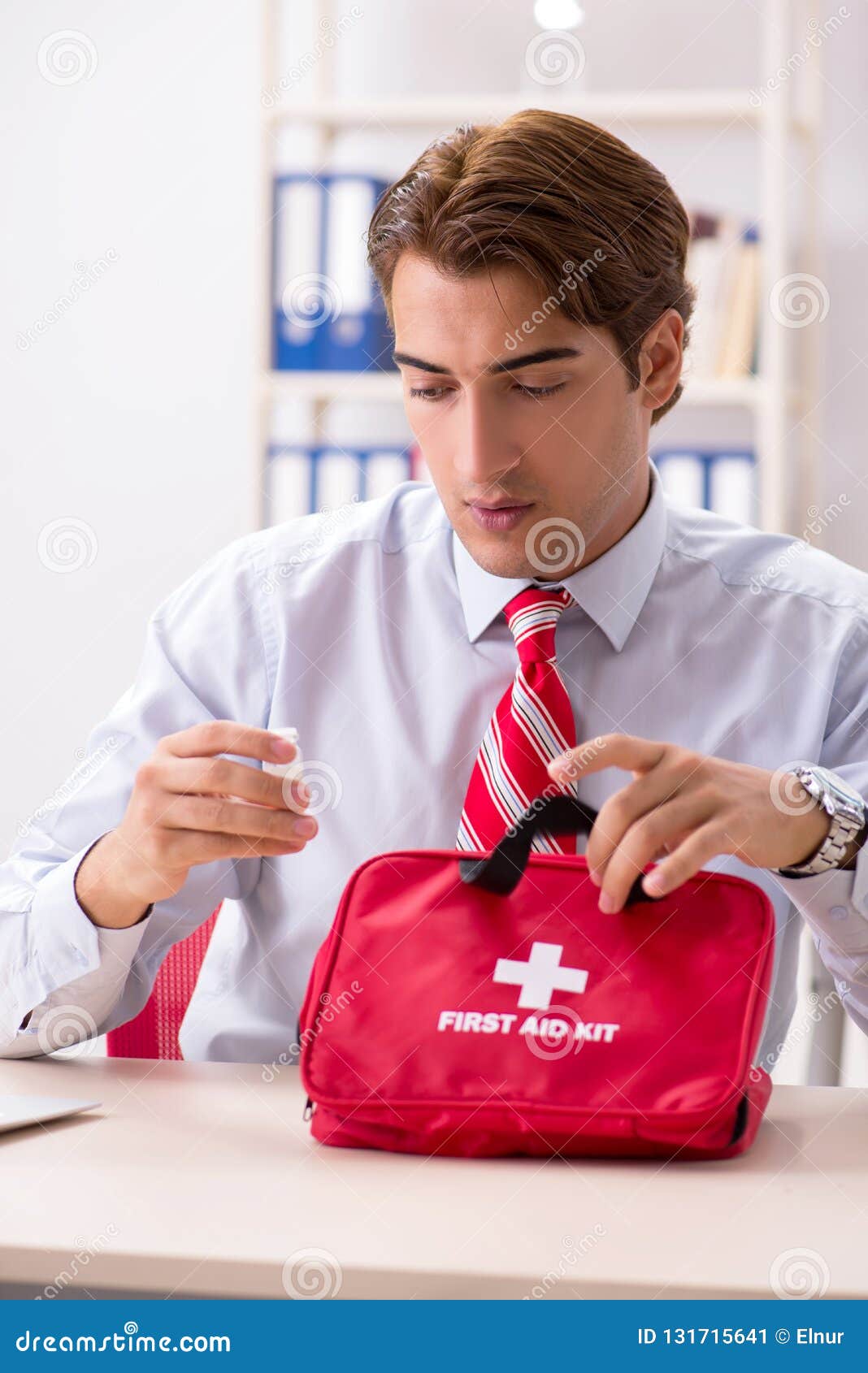 The Man with First Aid Kit in the Office Stock Image - Image of ...