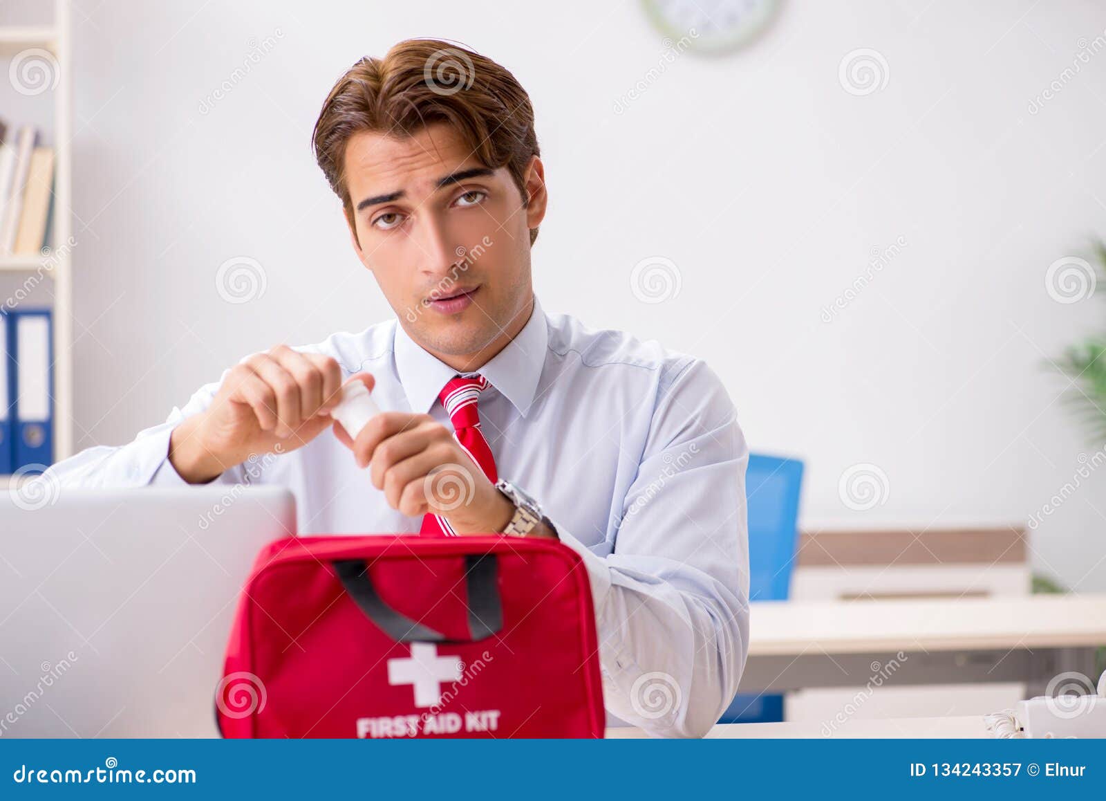 The Man with First Aid Kit in the Office Stock Image - Image of ...