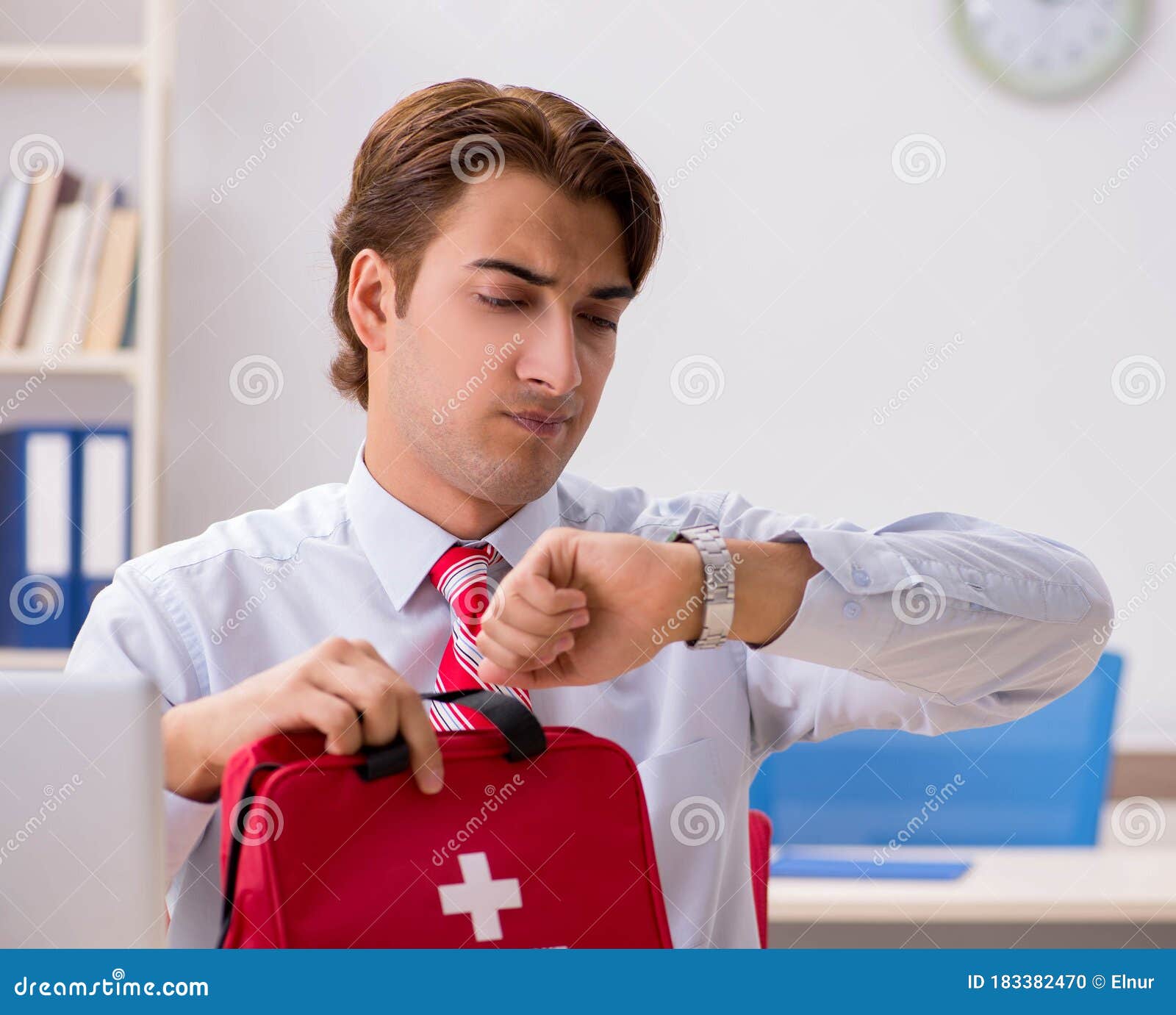 Man with First Aid Kit in the Office Stock Photo - Image of case ...