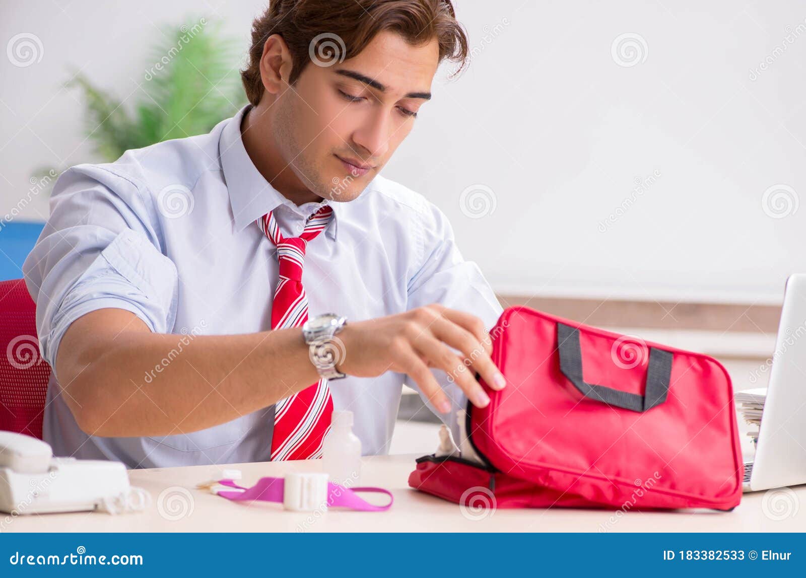 Man with First Aid Kit in the Office Stock Image - Image of accident ...