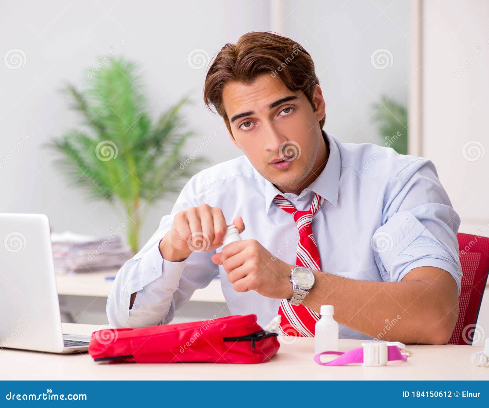 Man with First Aid Kit in the Office Stock Photo - Image of healthcare ...