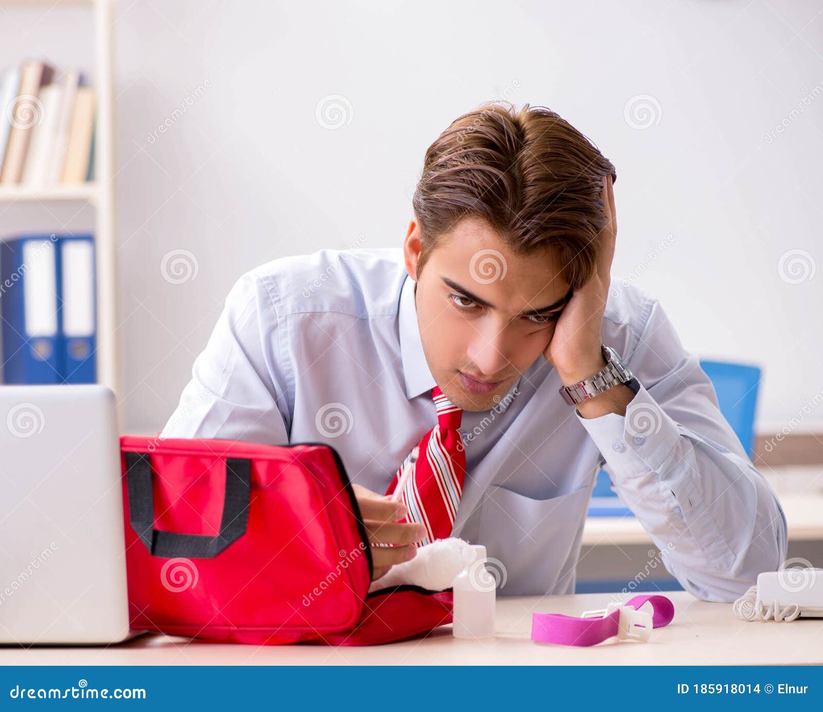 Man with First Aid Kit in the Office Stock Photo - Image of needle ...