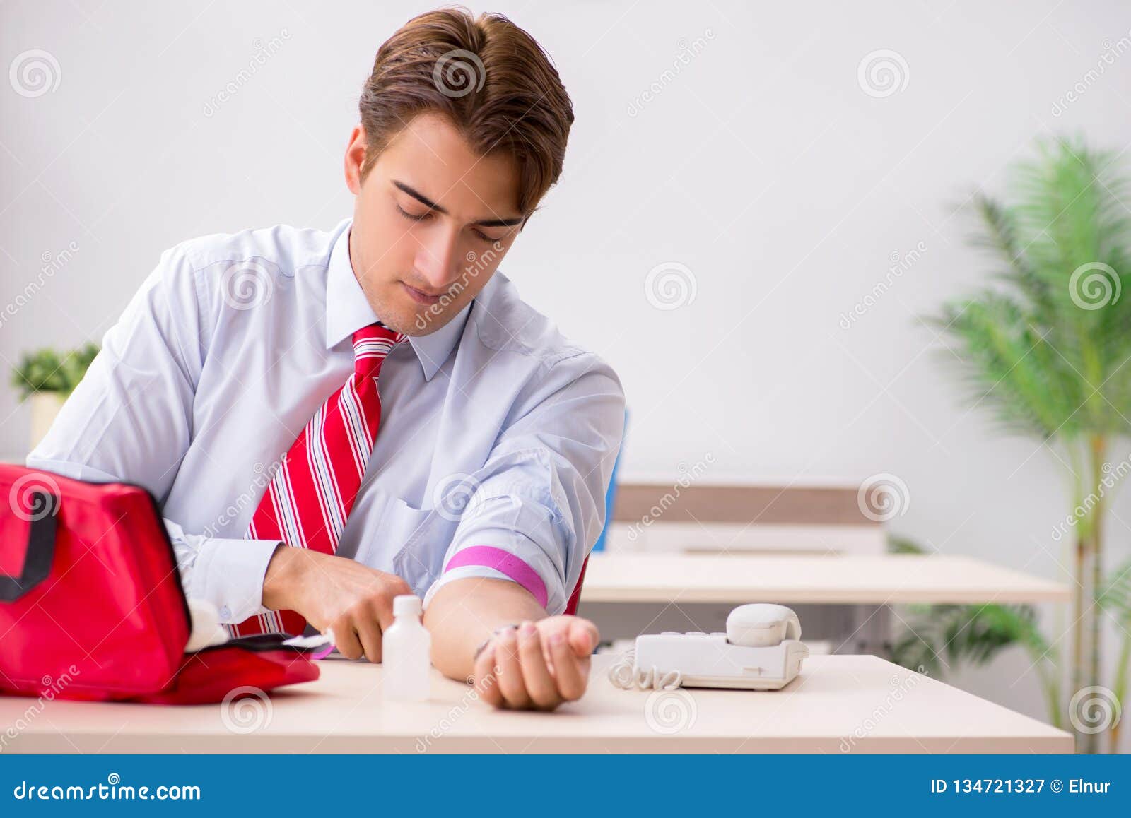 The Man with First Aid Kit in the Office Stock Image - Image of help ...