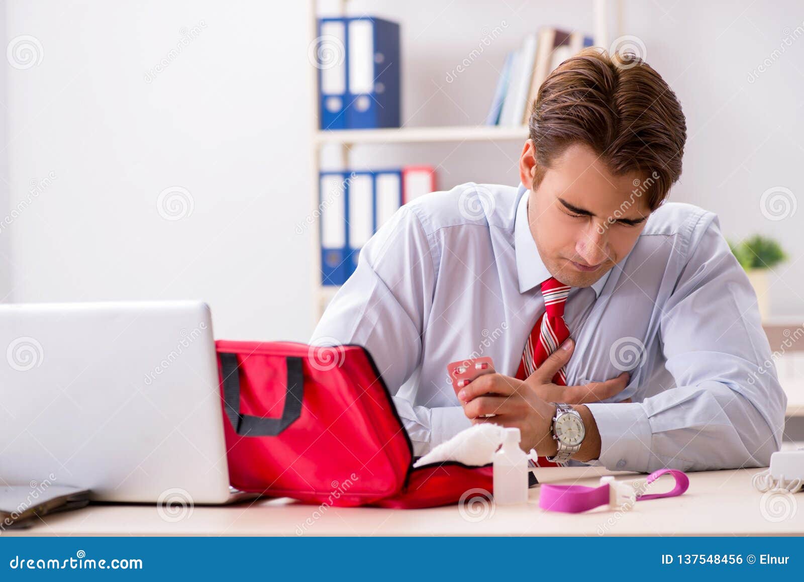 The Man with First Aid Kit in the Office Stock Photo - Image of ...