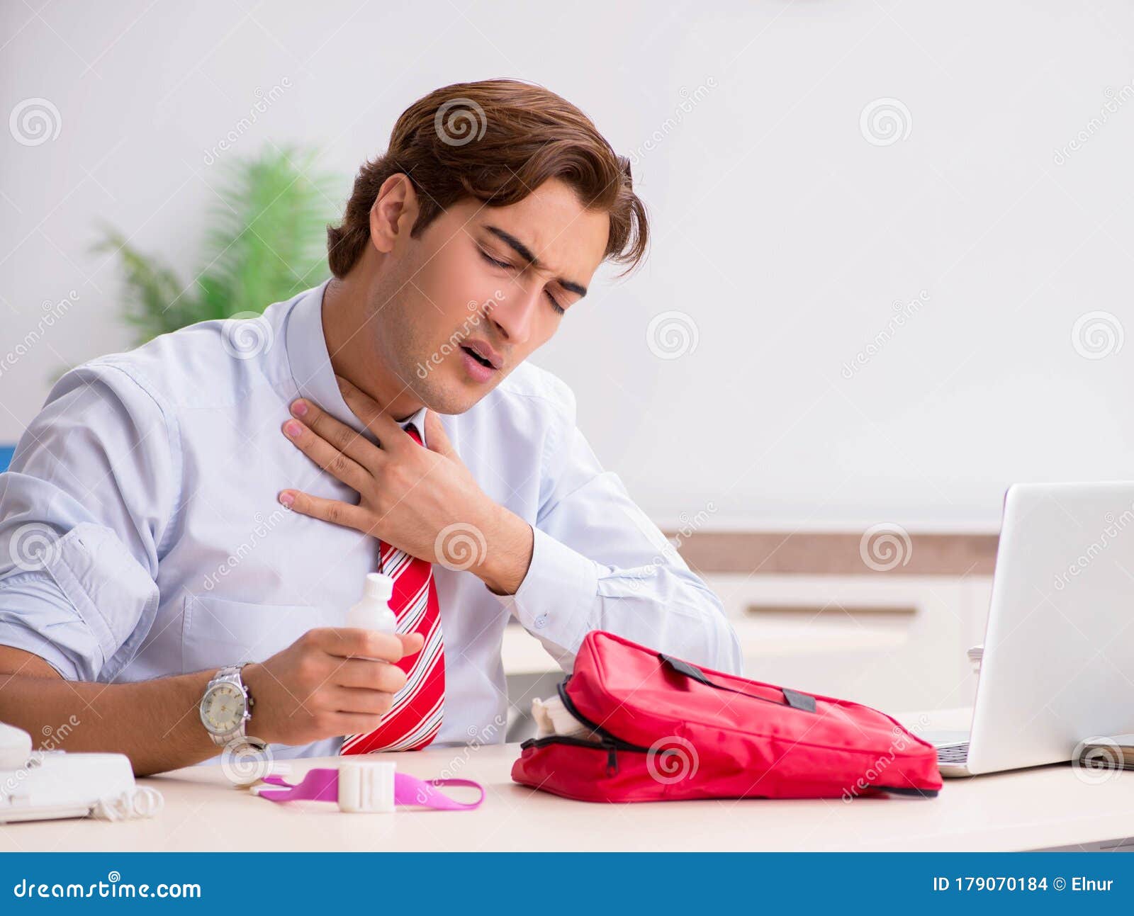 Man with First Aid Kit in the Office Stock Photo - Image of office ...