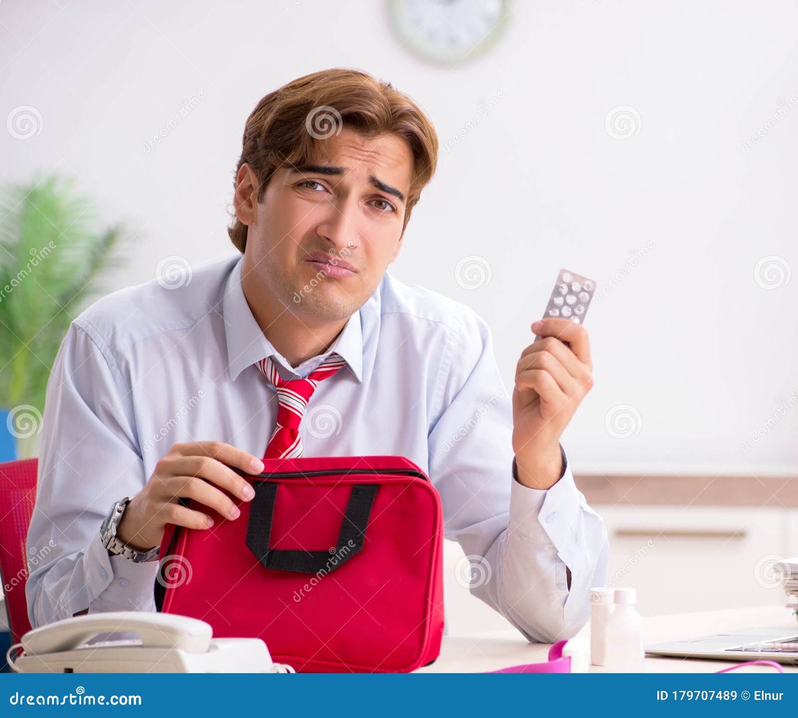 Man with First Aid Kit in the Office Stock Image - Image of employee ...