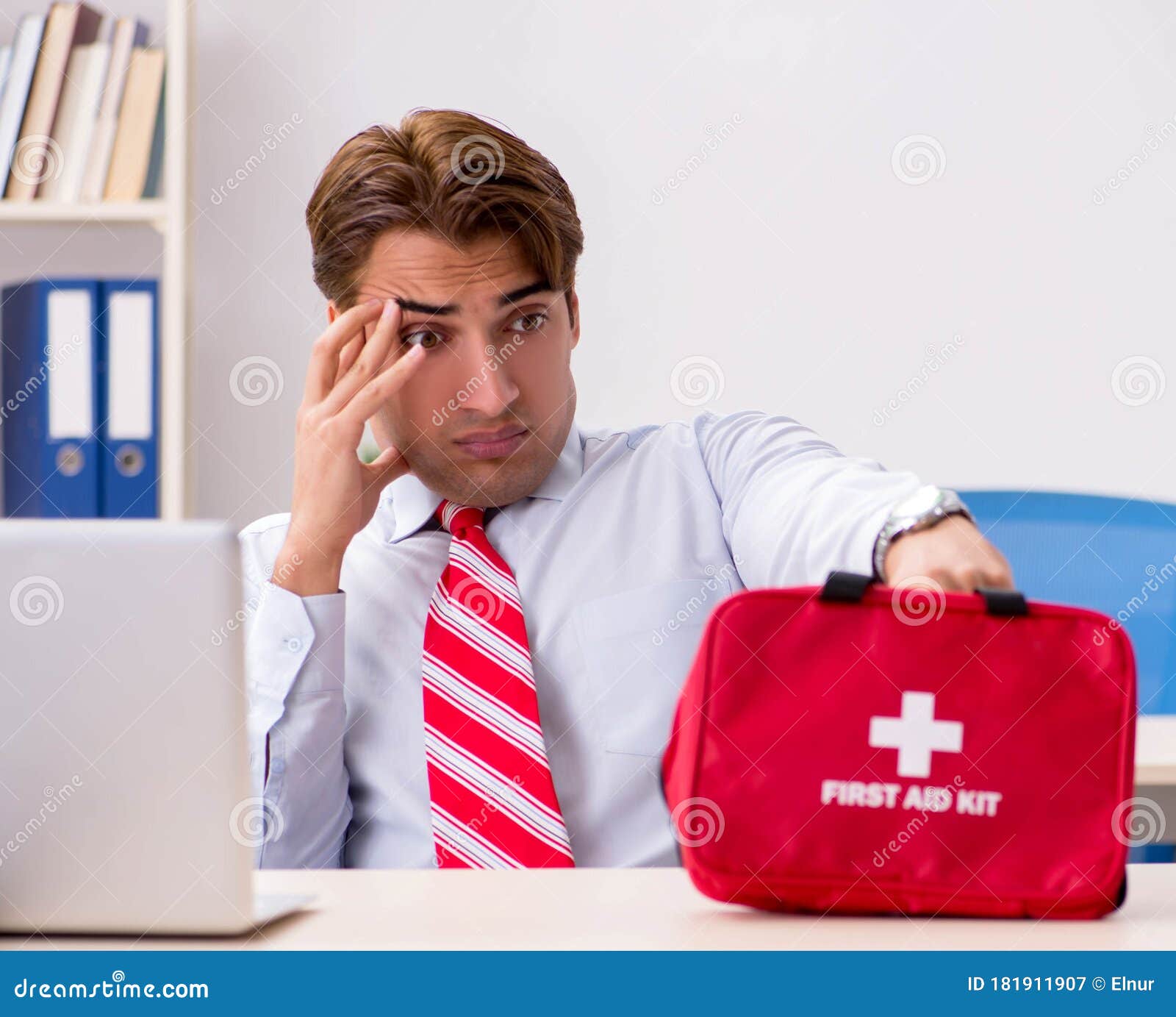Man with First Aid Kit in the Office Stock Image - Image of cross, desk ...