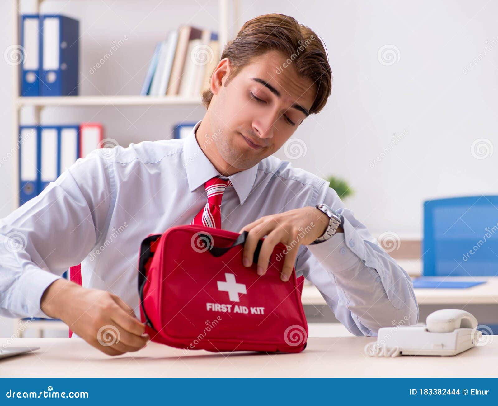 Man with First Aid Kit in the Office Stock Photo - Image of accident ...