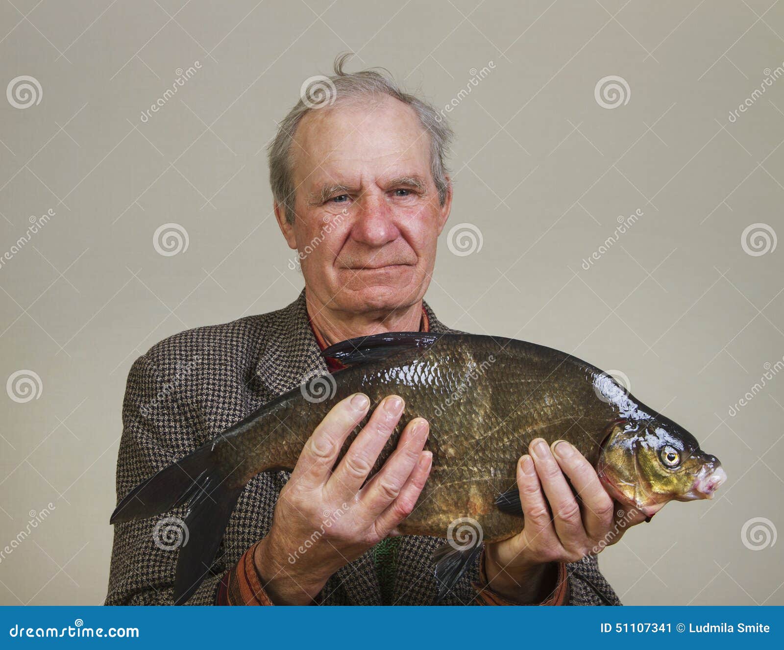 Man and fish. stock image. Image of holding, studio, blood - 51107341