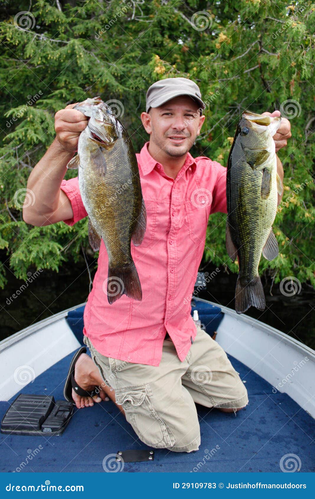 Man Fishing for Bass stock image. Image of grin, fish - 29109783
