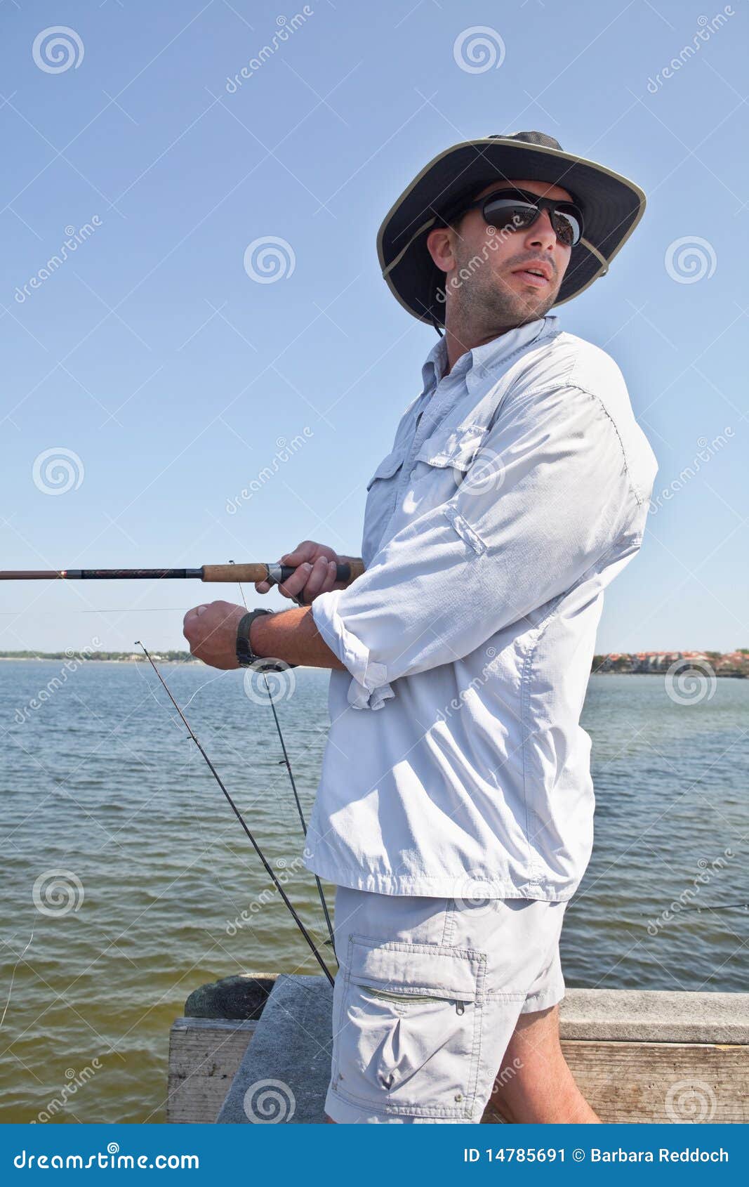 Man Fishing from Pier stock image. Image of ocean, sport - 14785691