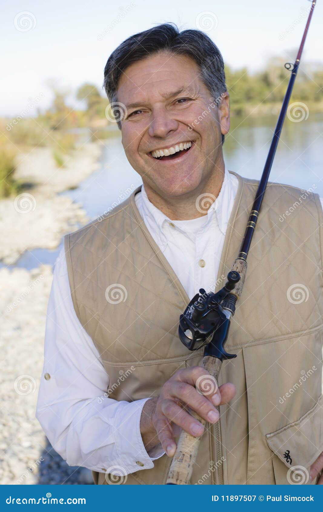 Man with Fishing Pole stock image. Image of solitude - 11897507
