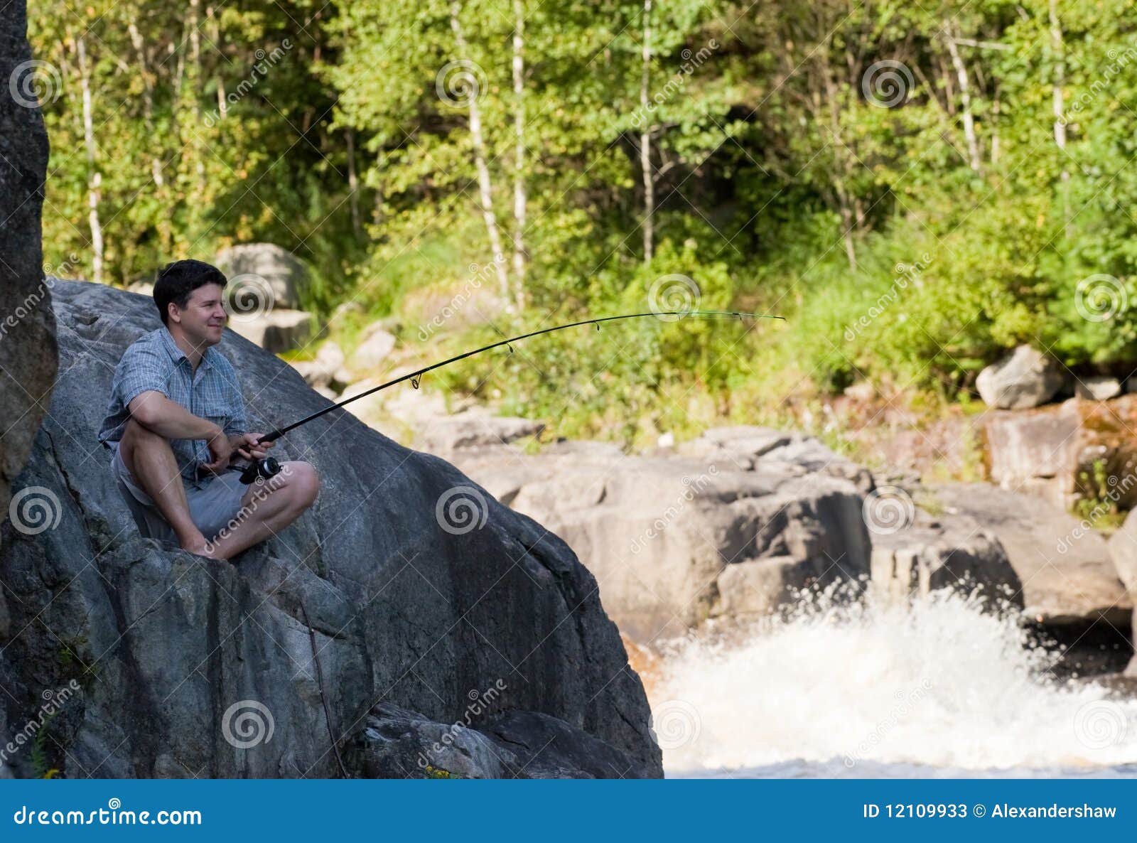Man Fishing by Side of River Stock Image - Image of wilderness, canada ...
