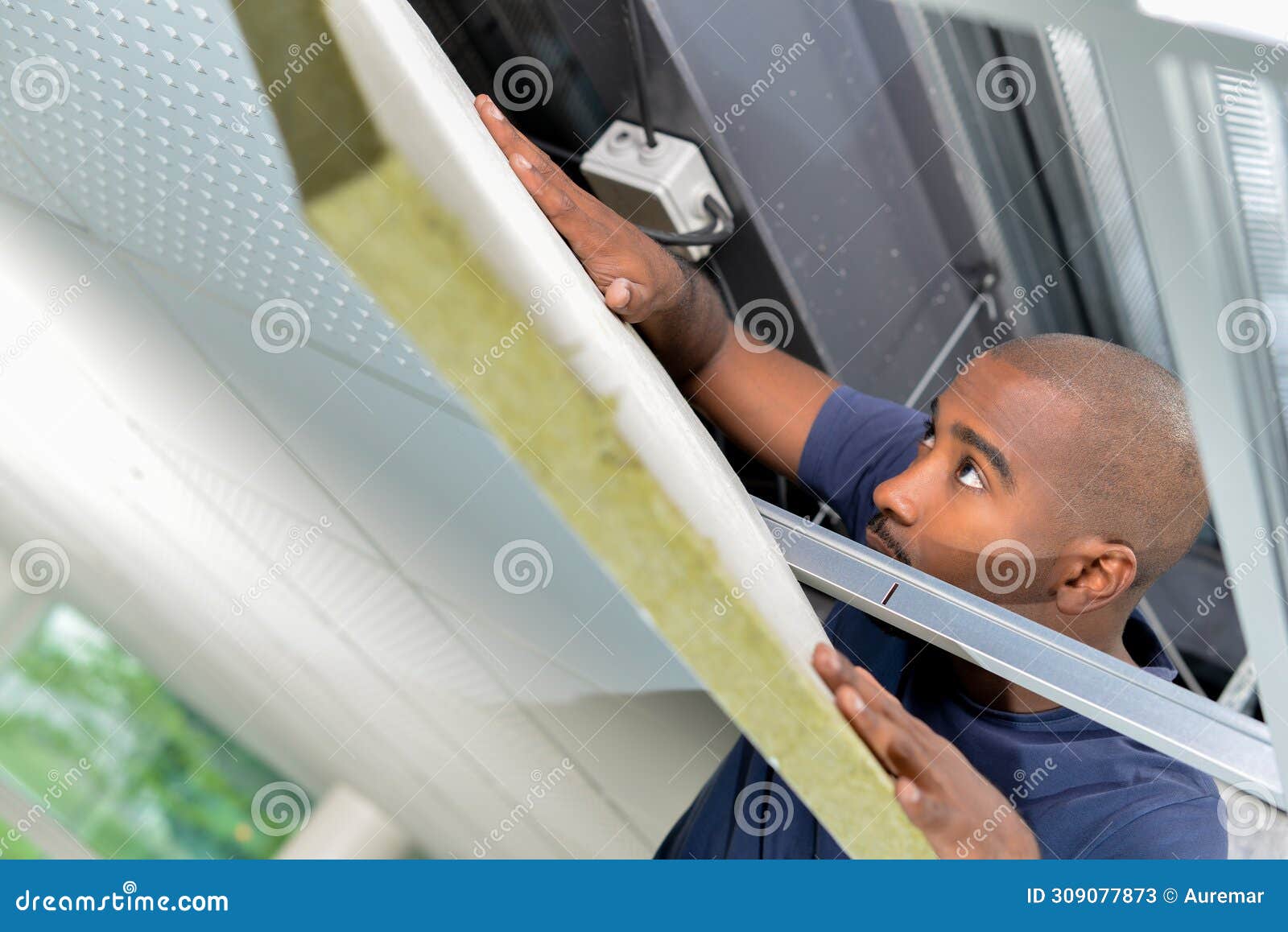 Man fitting ceiling panel stock image. Image of black - 309077873