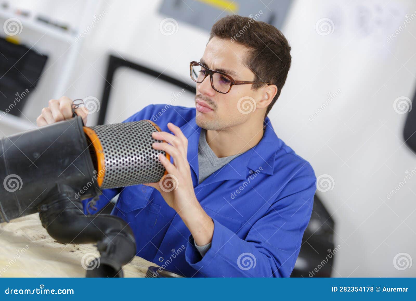 Man Fitting Filter into Plastic Tube Stock Photo - Image of insert ...