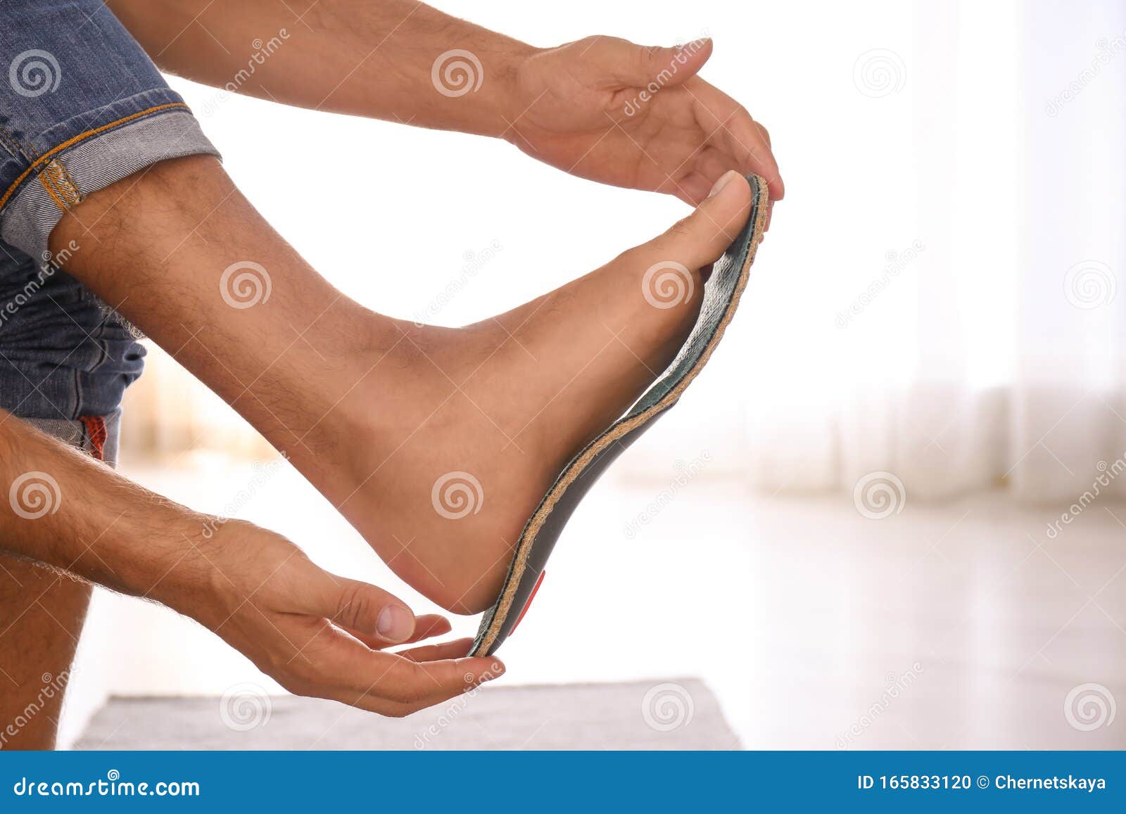 Man Fitting Orthopedic Insole at Home Stock Photo - Image of feet ...