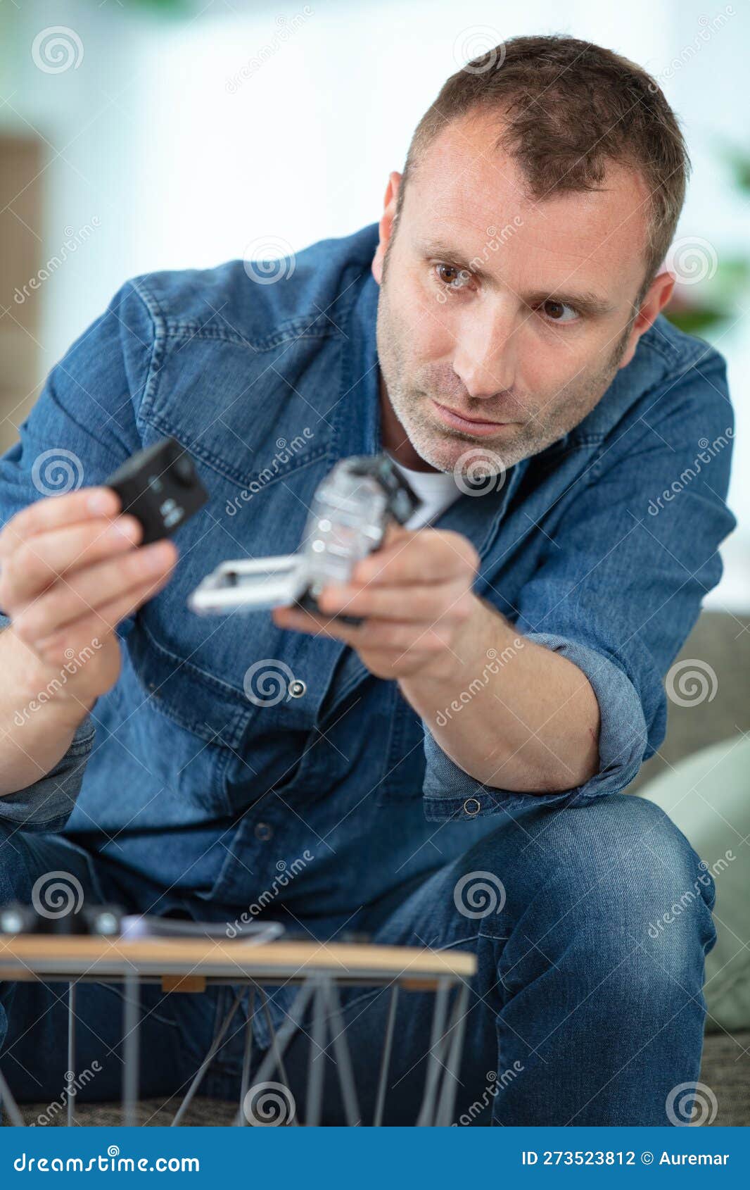 Man Fitting Water Proof Case To Gopro Stock Photo - Image of standing ...