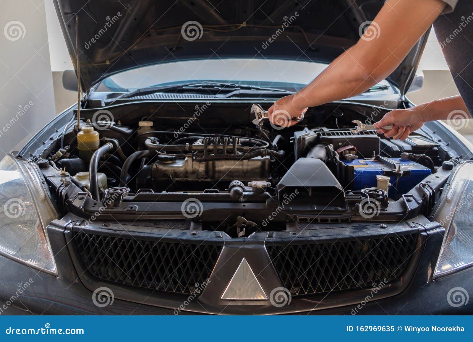 Man Fix a car stock image. Image of automobile, care - 162969635