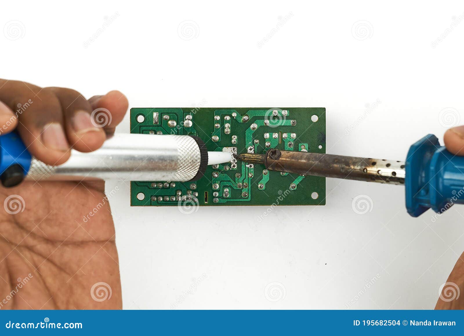 A Man Fix a Green Pcb (printed Circuit Board) with Solder Stock Photo ...
