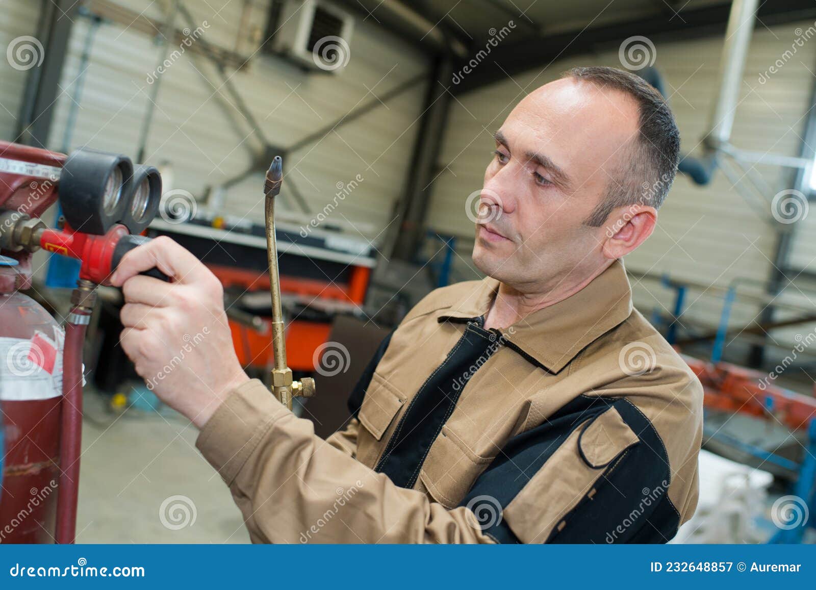 Man fix machine in factory stock image. Image of tool - 232648857