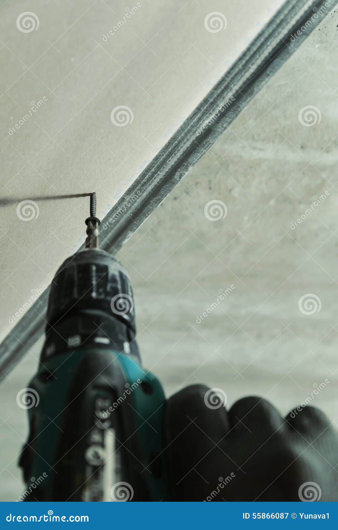 Man fixes the drywall stock image. Image of drywall, repairing - 55866087