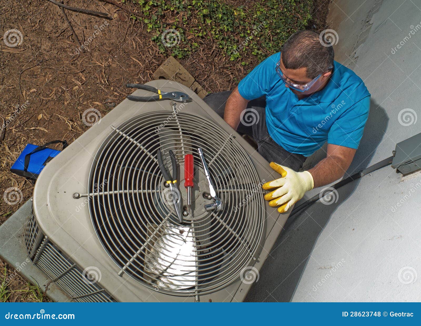 Man fixing air conditioner stock photo. Image of hands - 28623748