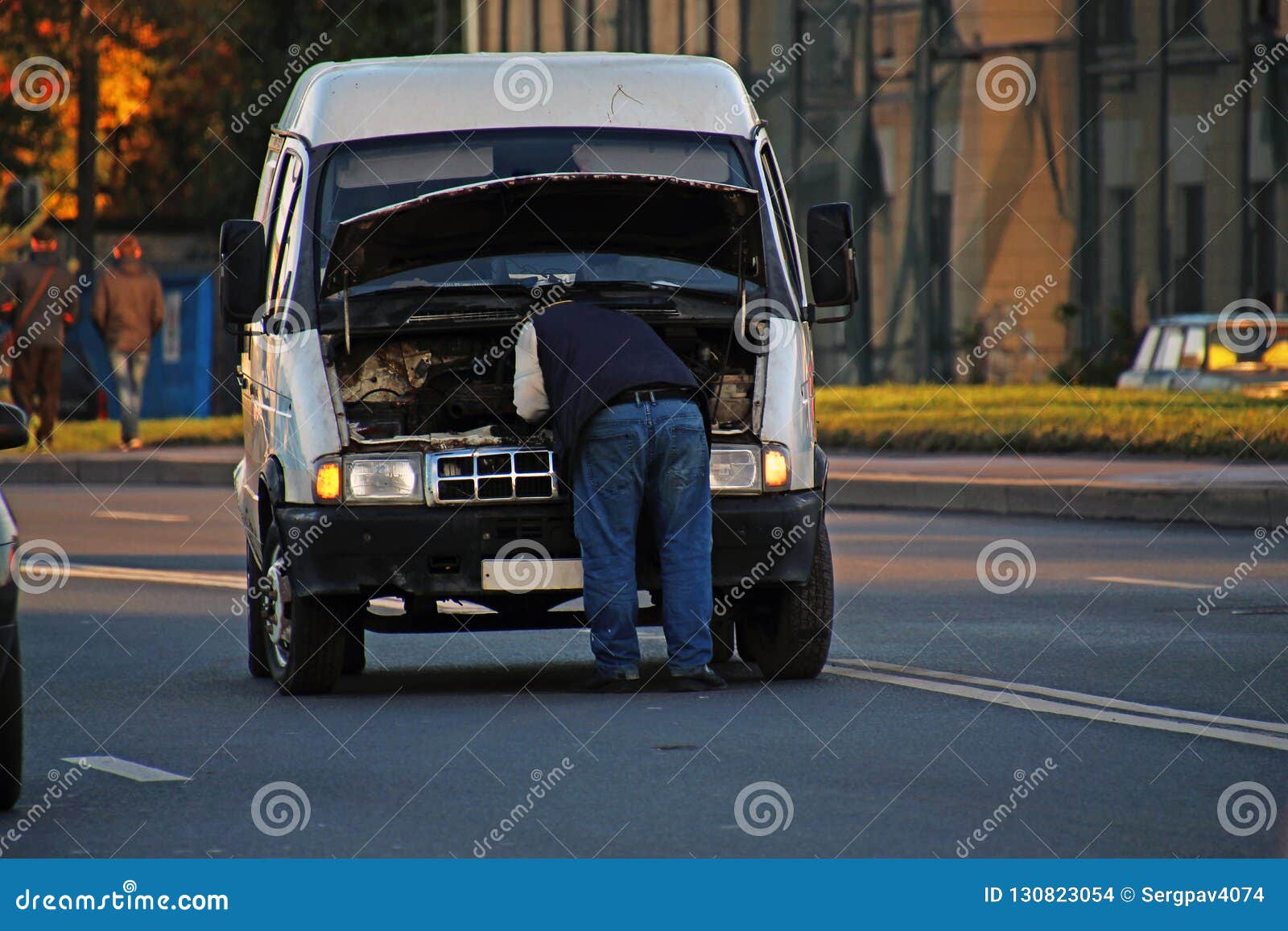 Man Fixing a Car on the Road Stock Photo - Image of auto, delivery ...