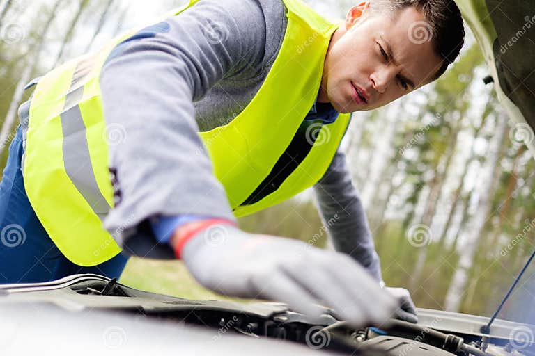 Man fixing broken car stock photo. Image of service, hood - 53700018