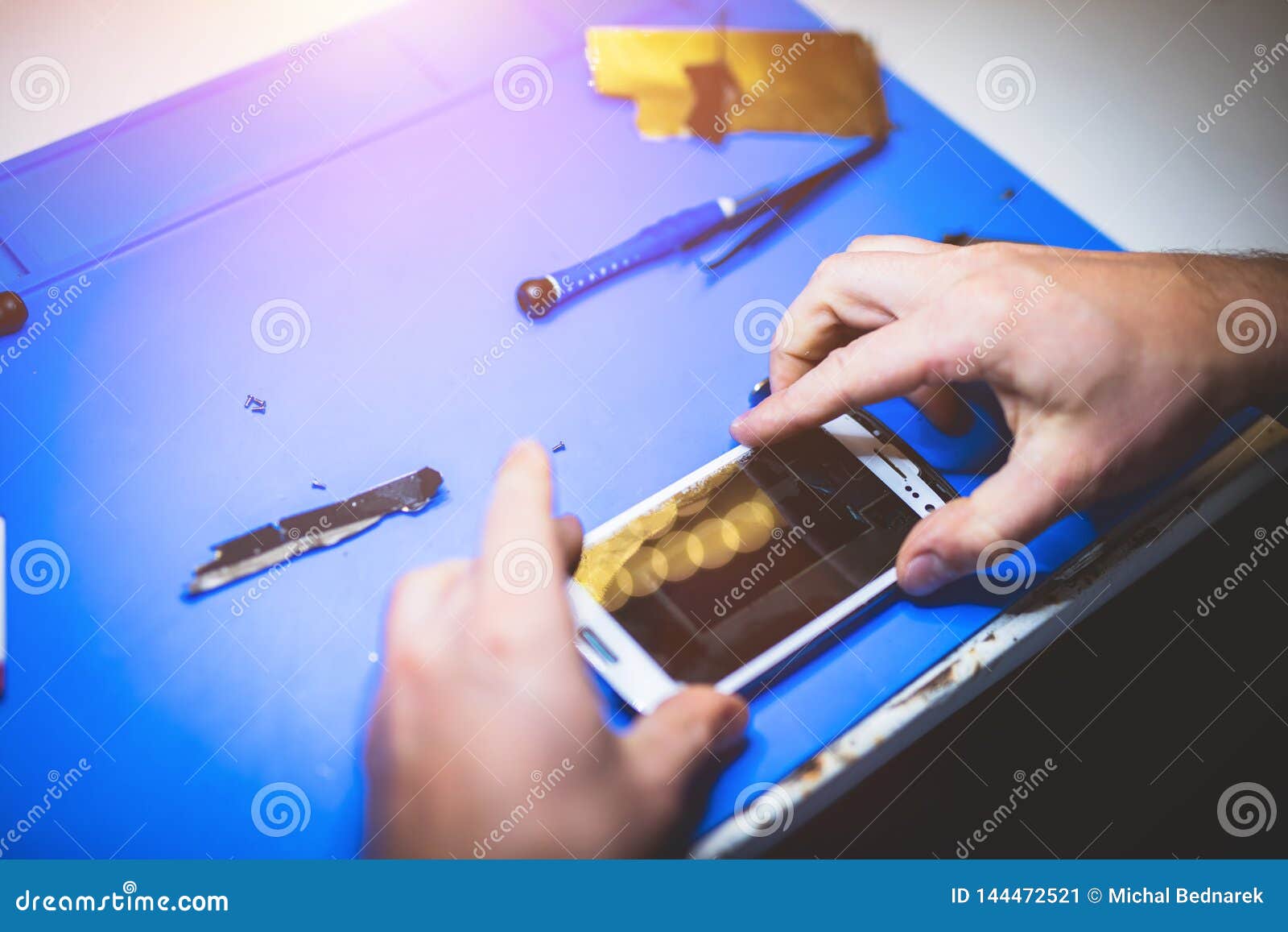 Man Fixing Broken Mobile Device Stock Image - Image of engineer ...