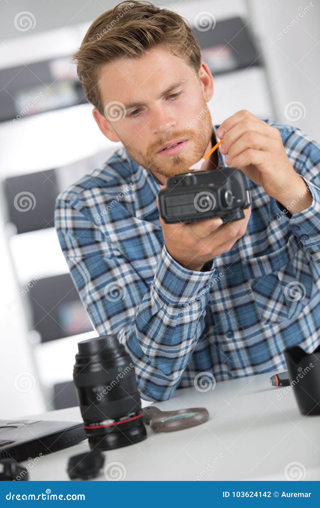 Man Fixing Camera Lens on Office Table Stock Photo - Image of ...