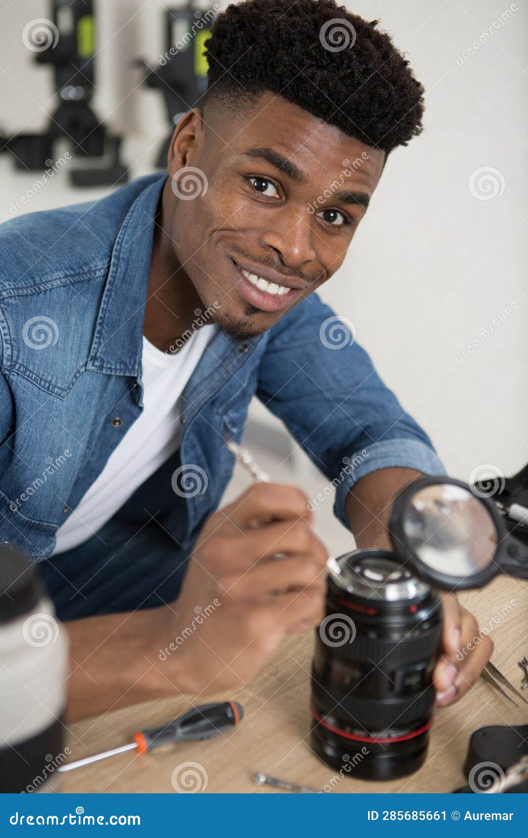 Man Fixing Camera Lens with Screwdriver Stock Image - Image of ...