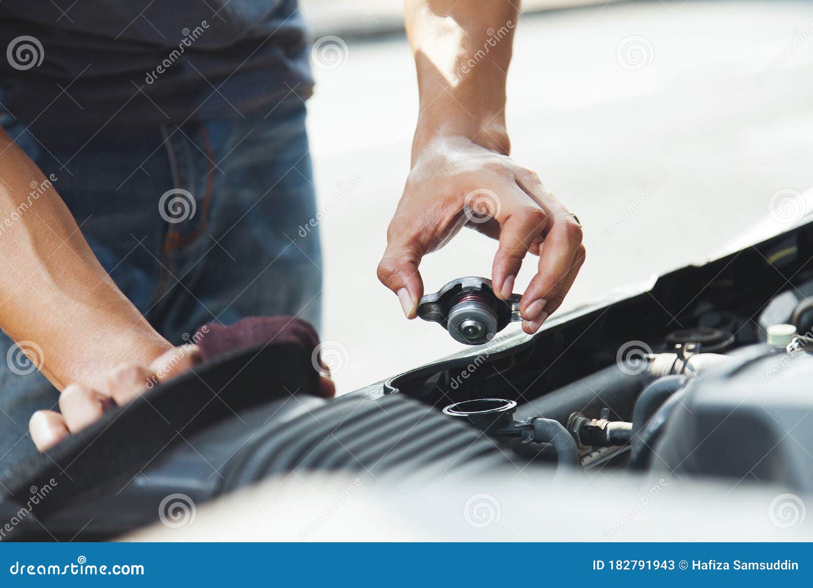 Man fixing a car stock image. Image of parts, examining - 182791943