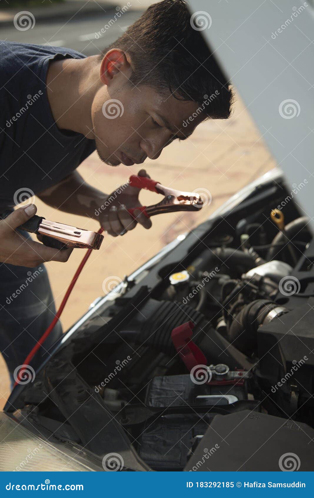 Man fixing a car stock image. Image of checking, opening - 183292185