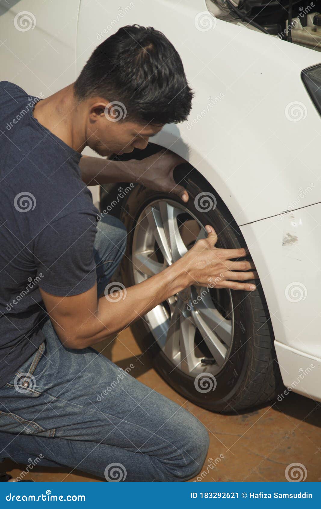 Man fixing a car stock image. Image of fixing, close - 183292621