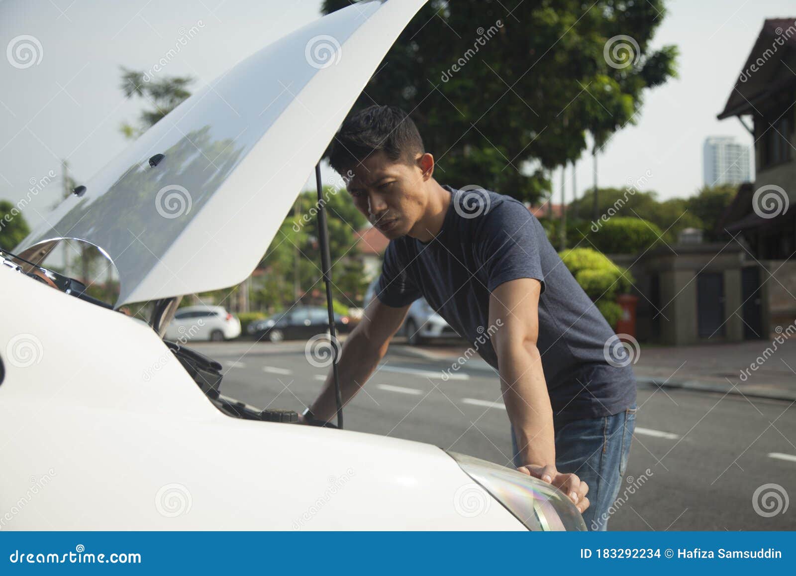 Man fixing a car stock photo. Image of transportation - 183292234