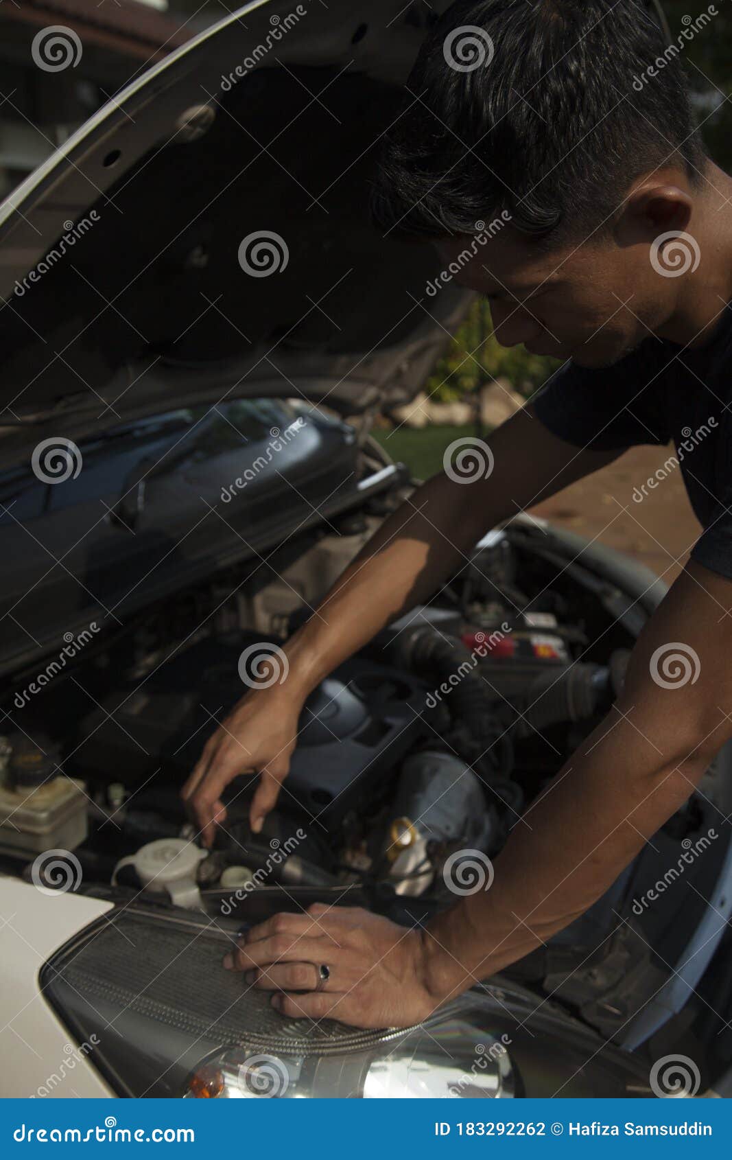 Man fixing a car stock photo. Image of parts, traveling - 183292262