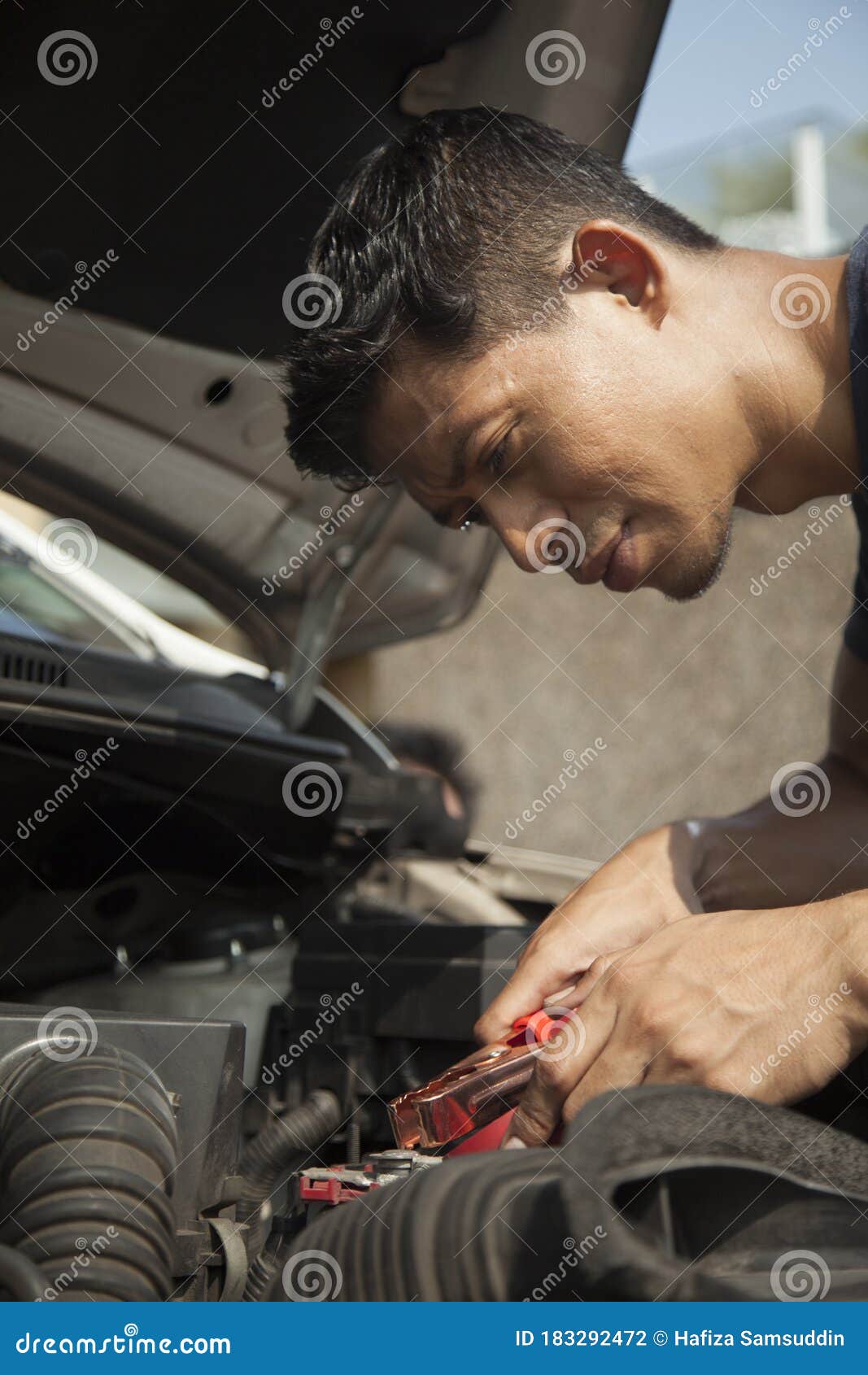 Man fixing a car stock photo. Image of fixing, vehicle - 183292472
