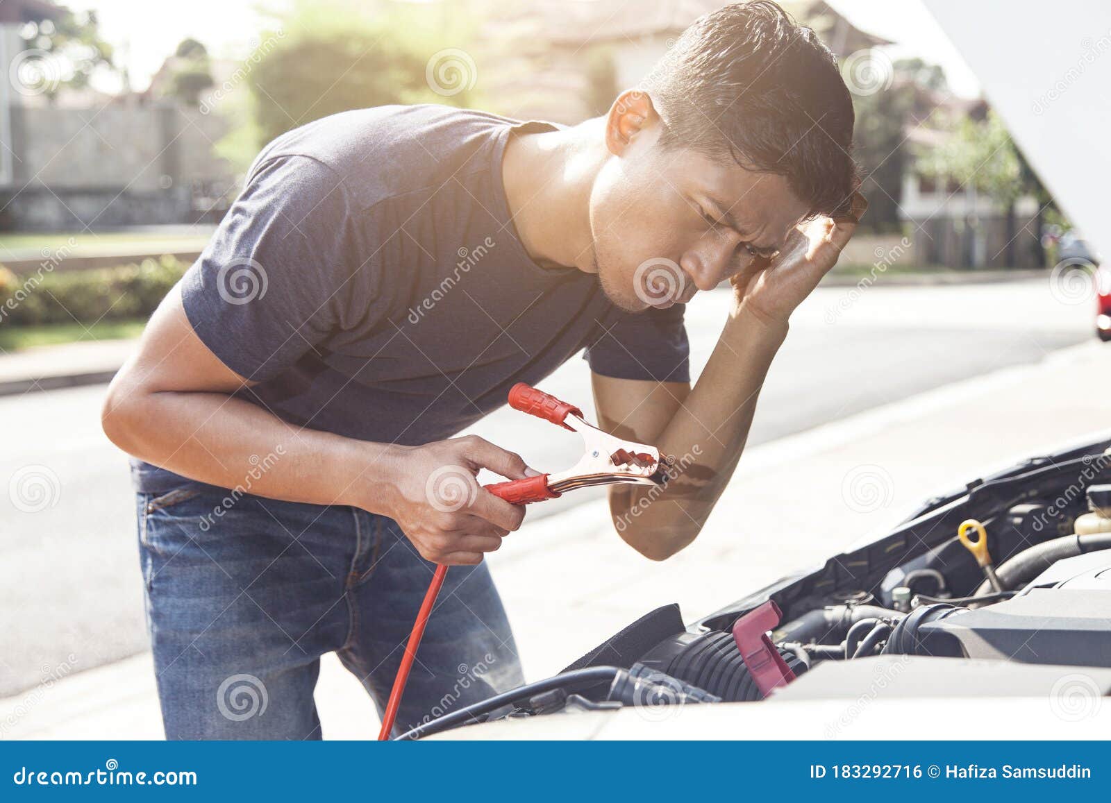 Man fixing a car stock photo. Image of outdoors, engine - 183292716