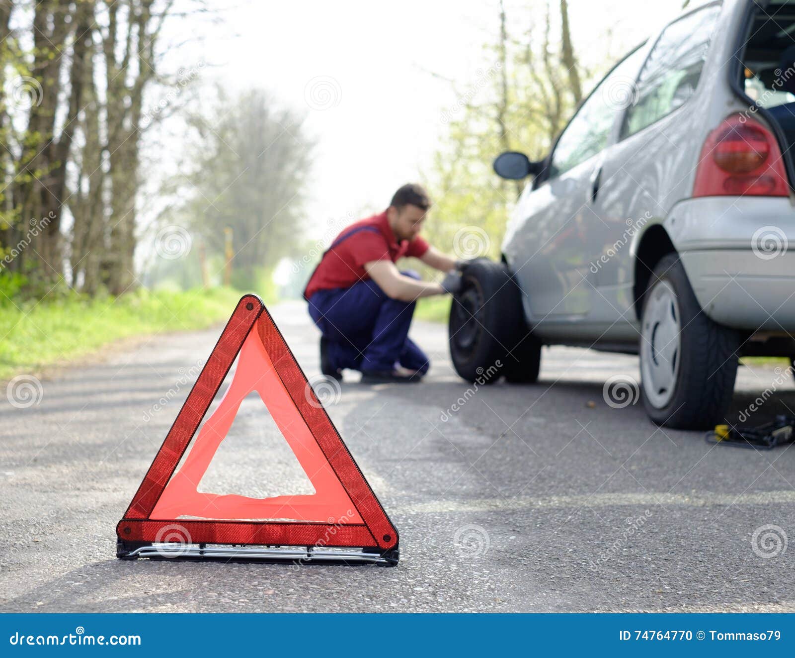 Man Fixing a Car Problem after Vehicle Breakdown on the Road Stock ...