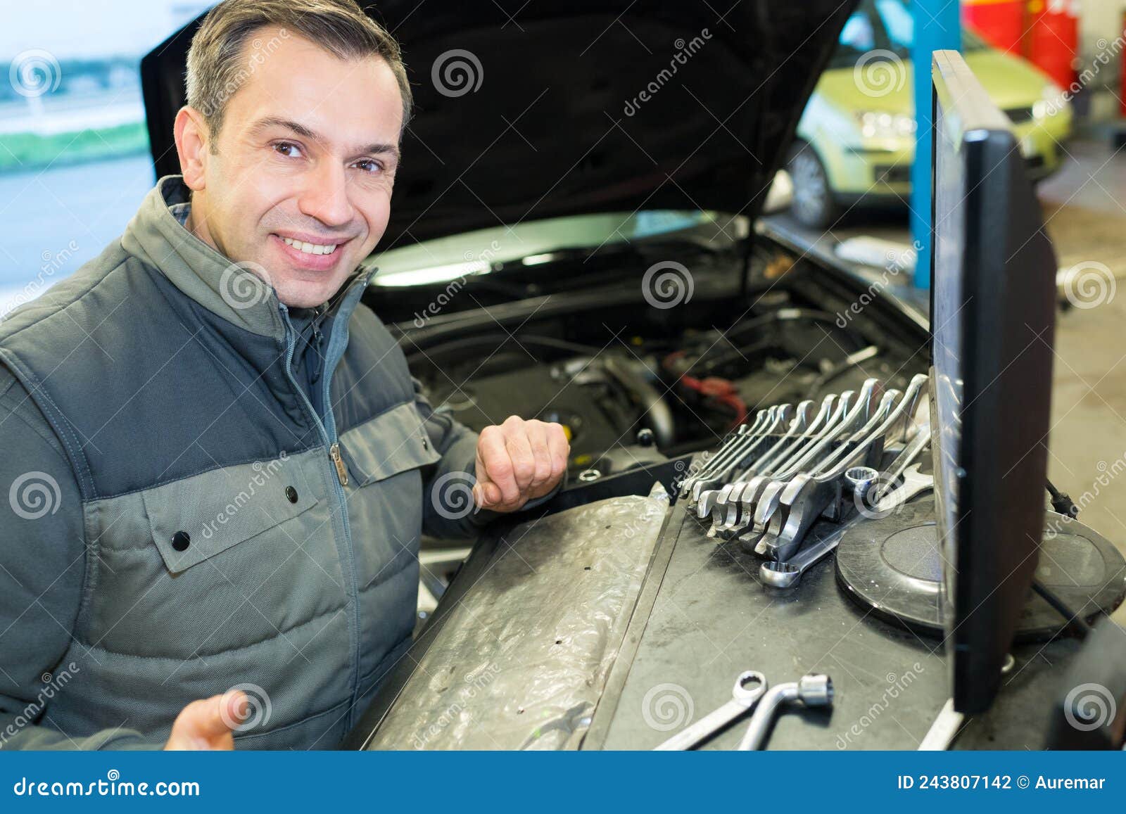Man fixing car on street stock photo. Image of driving - 243807142